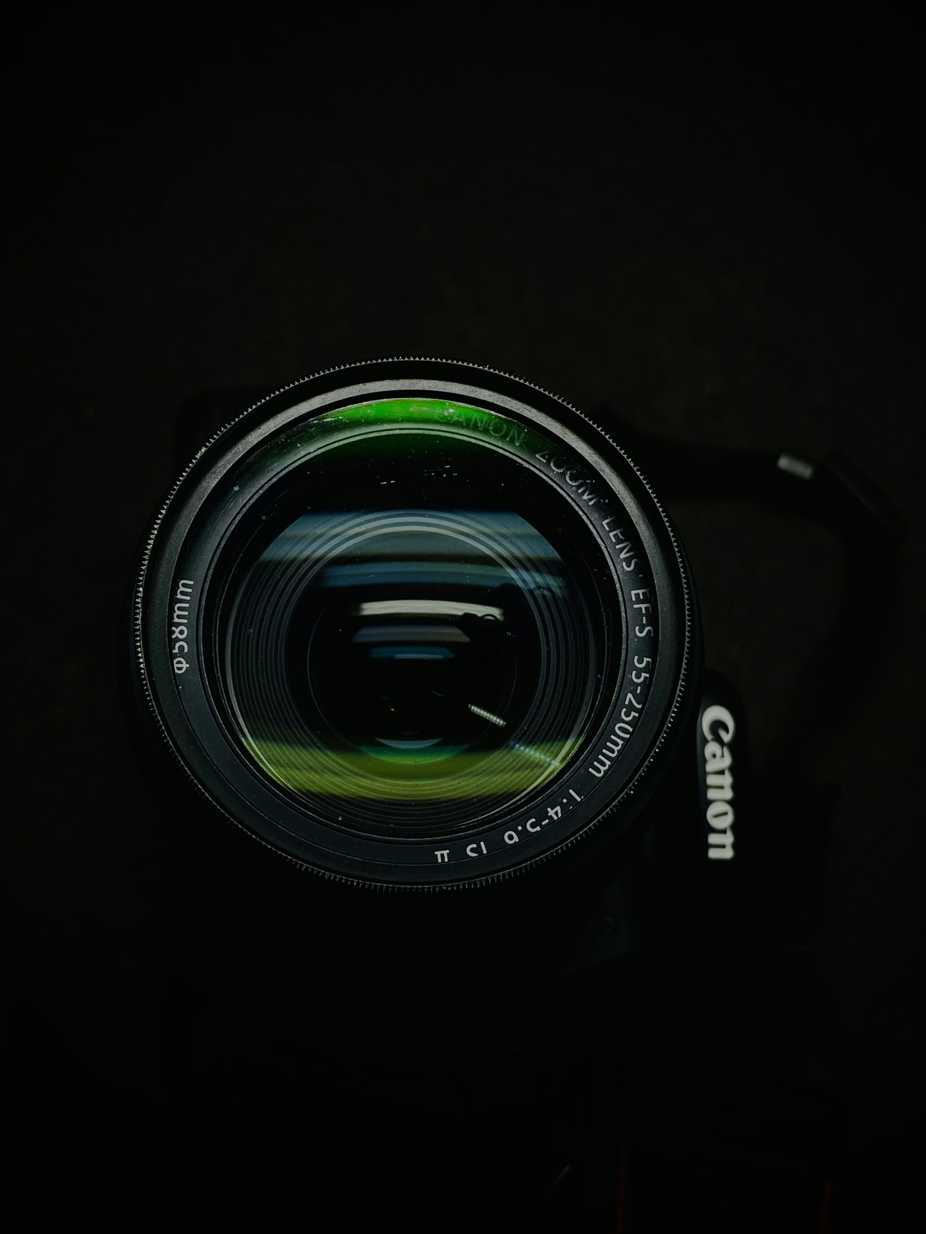 A camera lens sitting on top of a table photo – Free Electronics Image ...