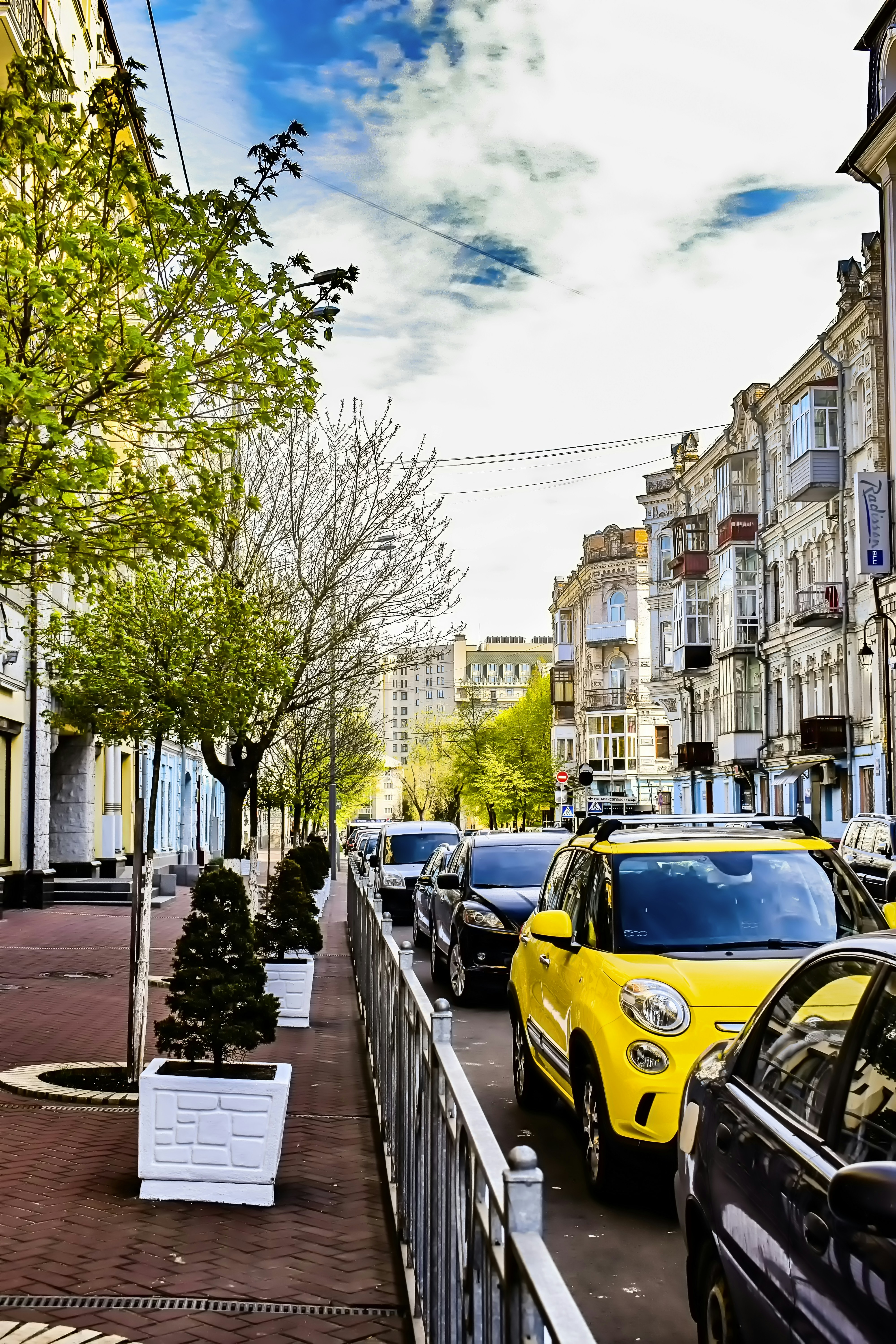 Yellow Taxi and City Line: A Bright Street Portrait