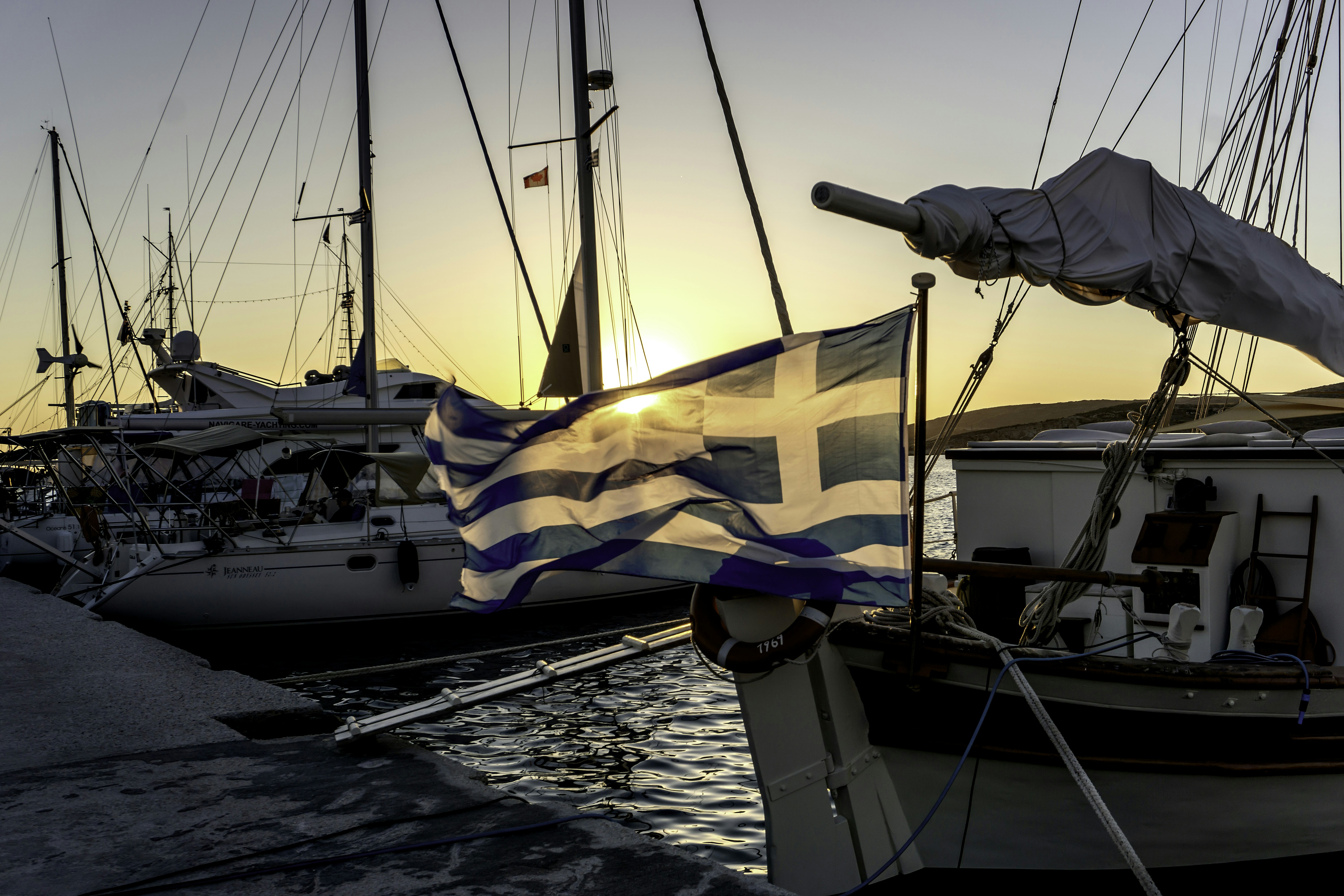 Flag of the Sea: Sunset Over a Quiet Marina