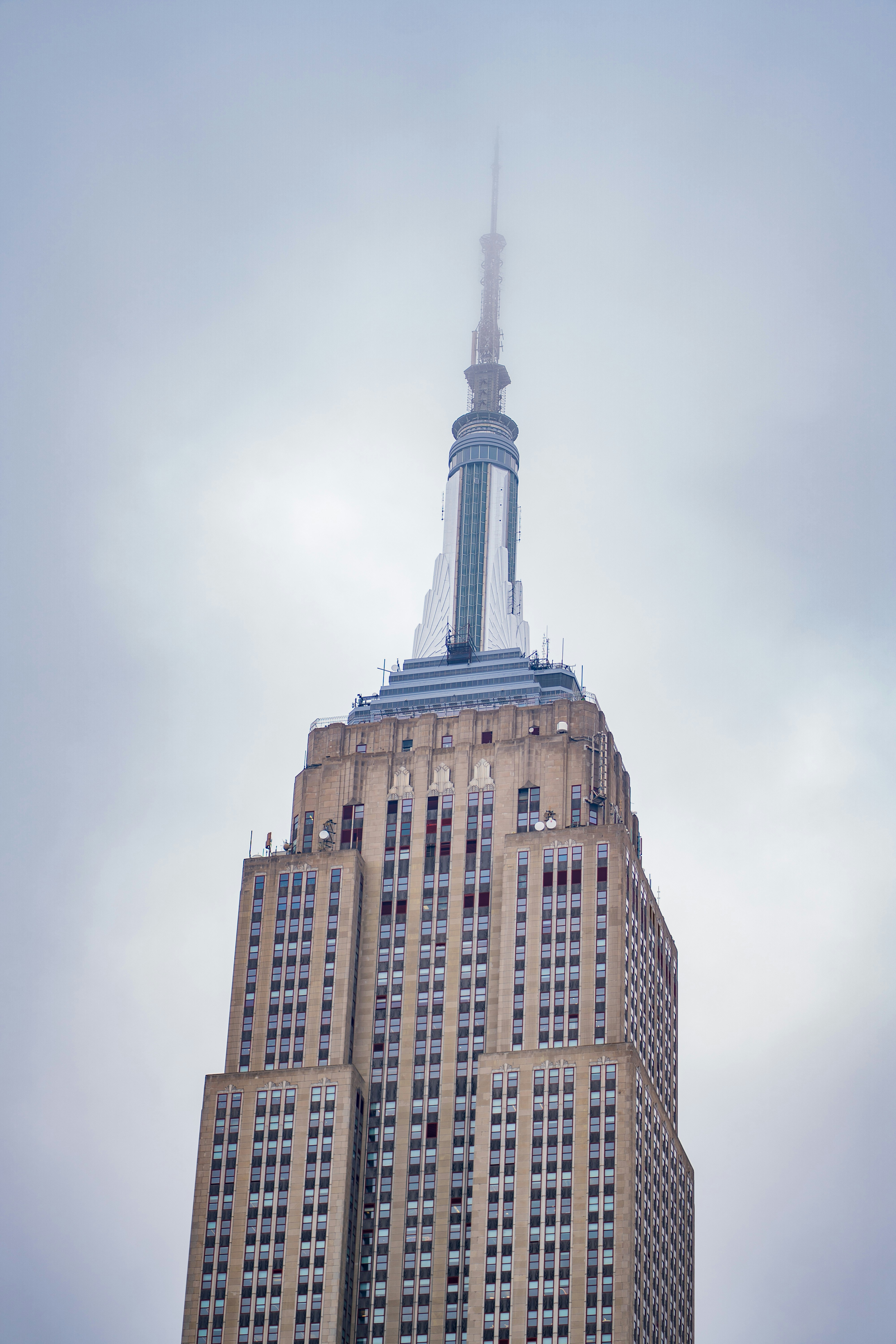 A very tall building with a very tall spire photo – Free Grey Image on ...