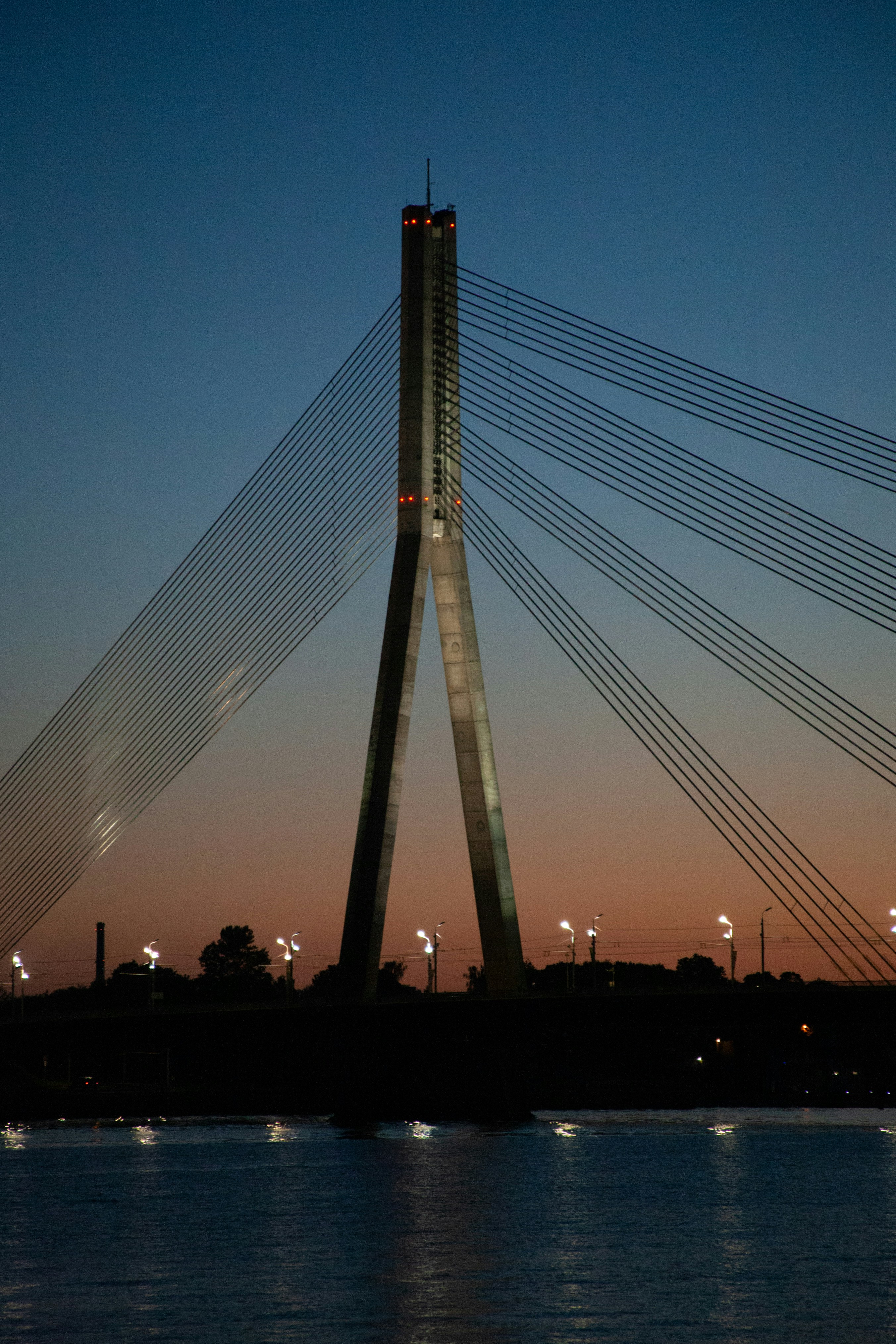 A very tall bridge over a large body of water photo – Free Grey Image ...