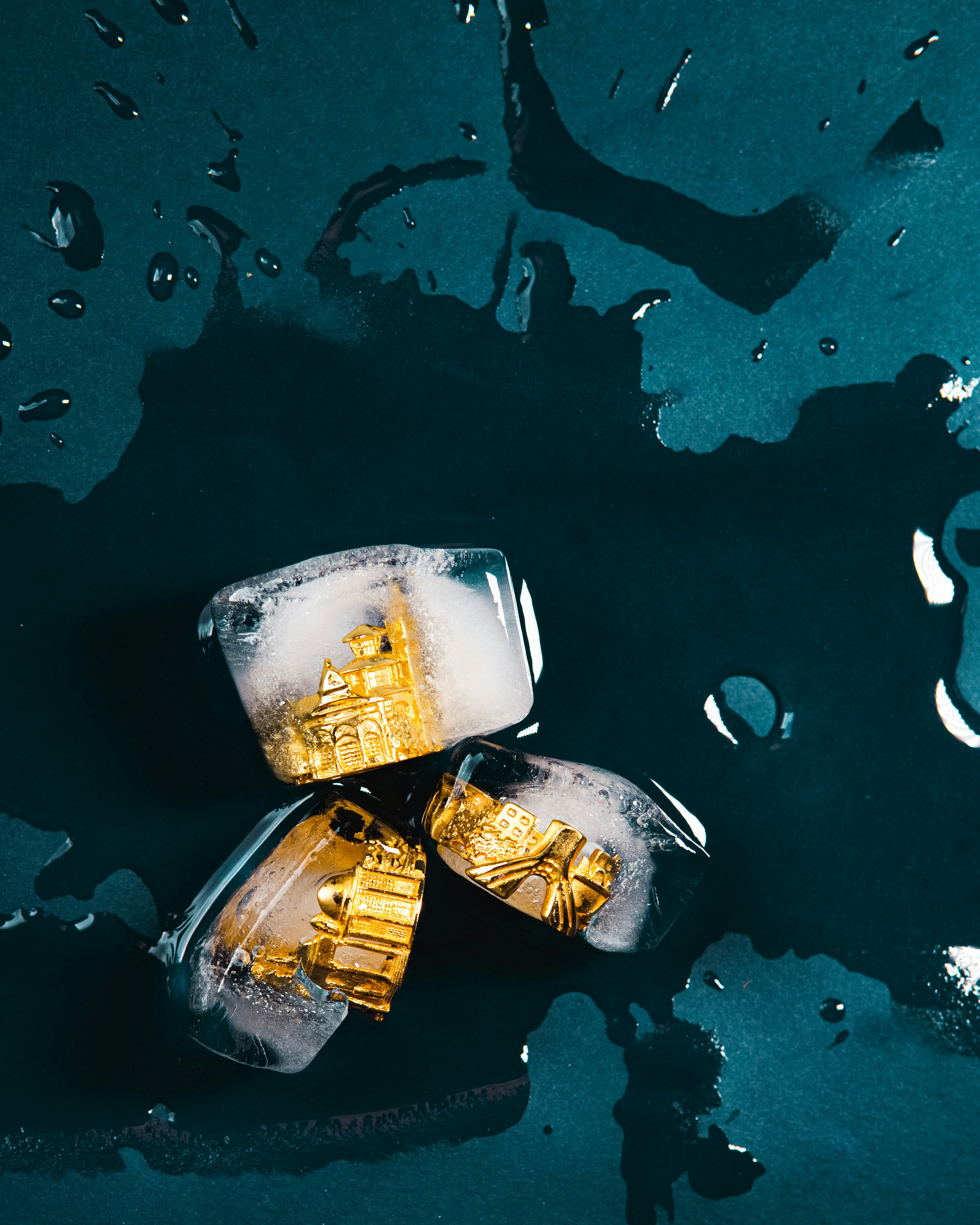 Glacial Cache: Gold Bars Encased in Ice