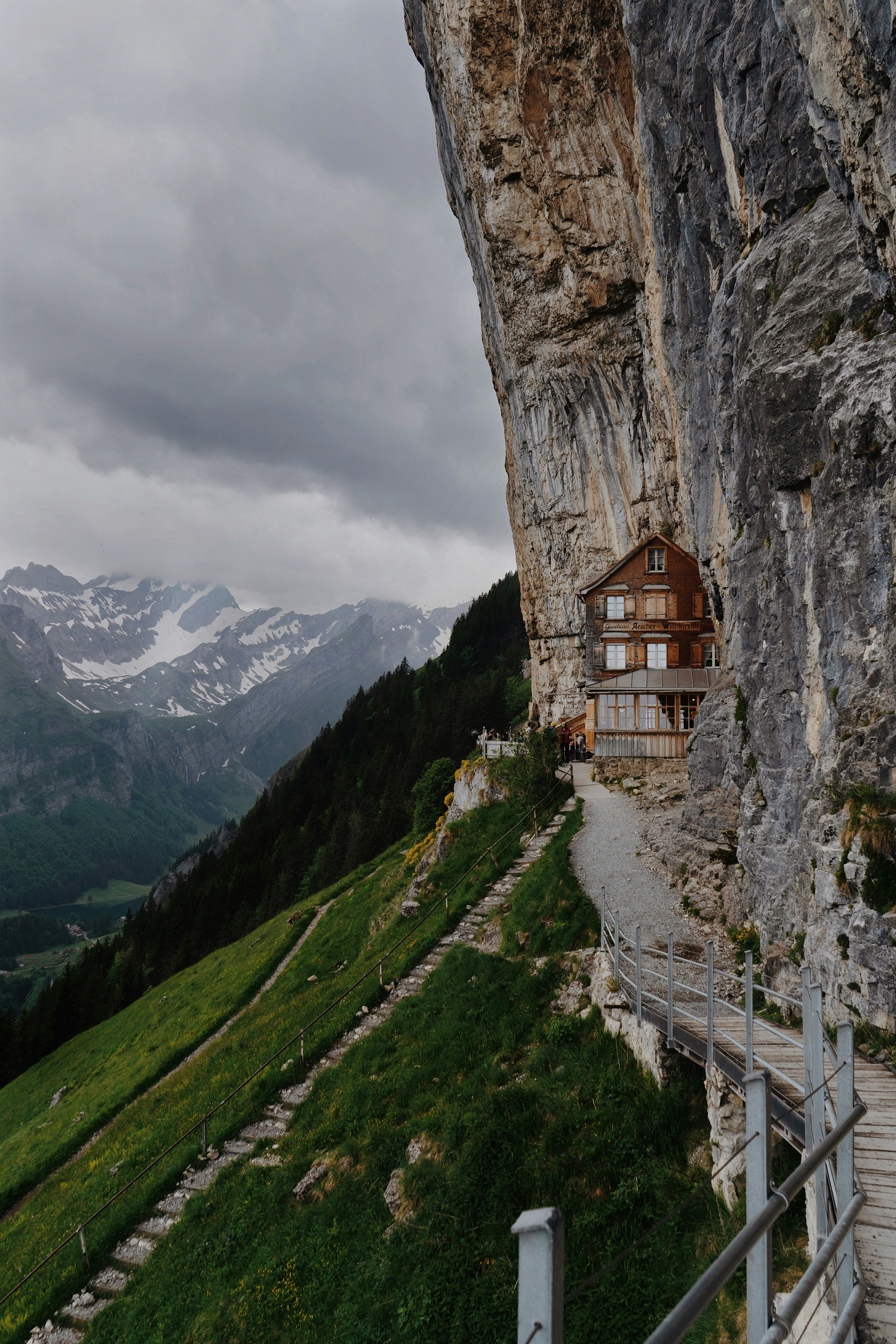 A house on the side of a cliff photo – Free Aescher - gasthaus am berg ...