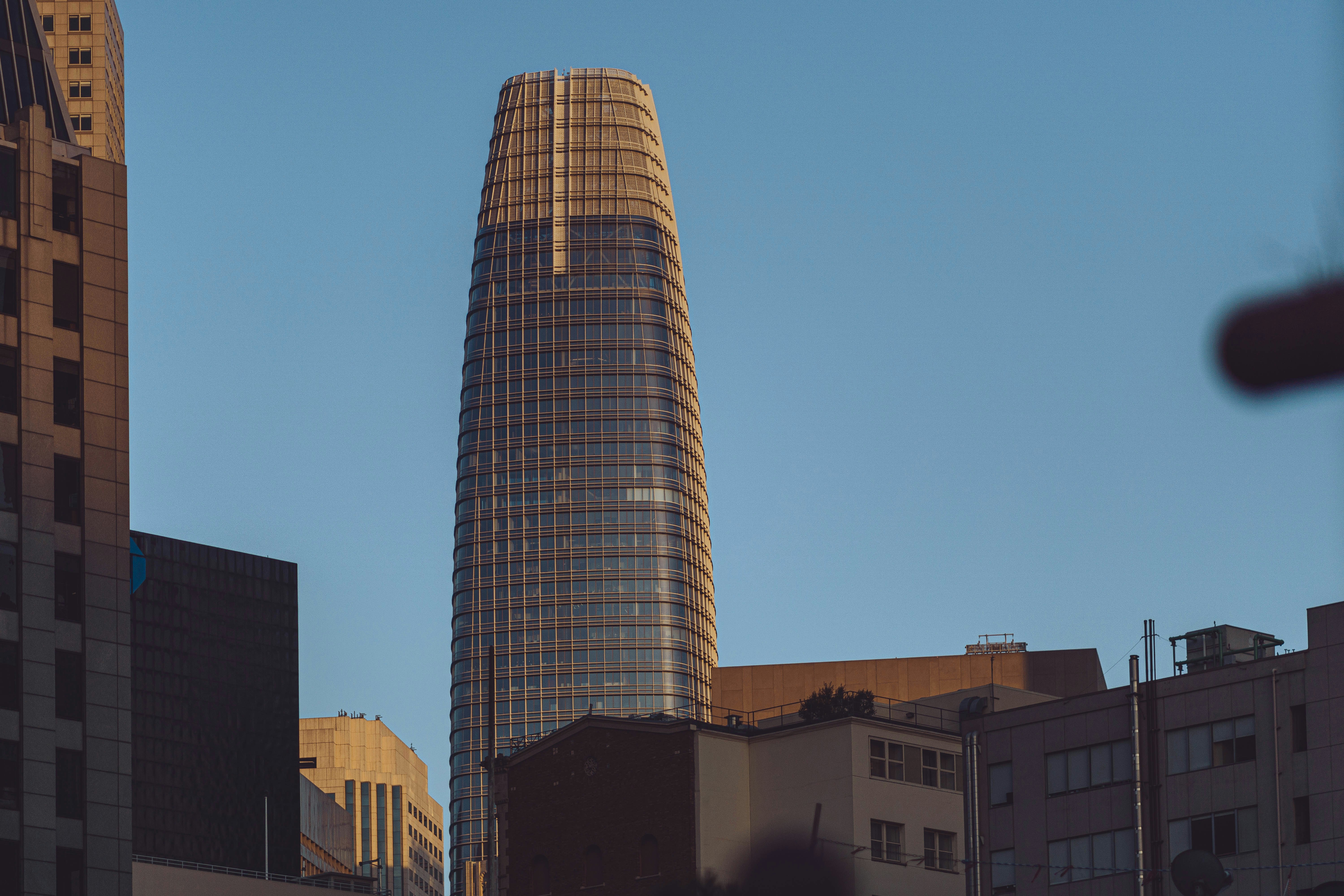 Central Tower Rises Above Rooftop Line