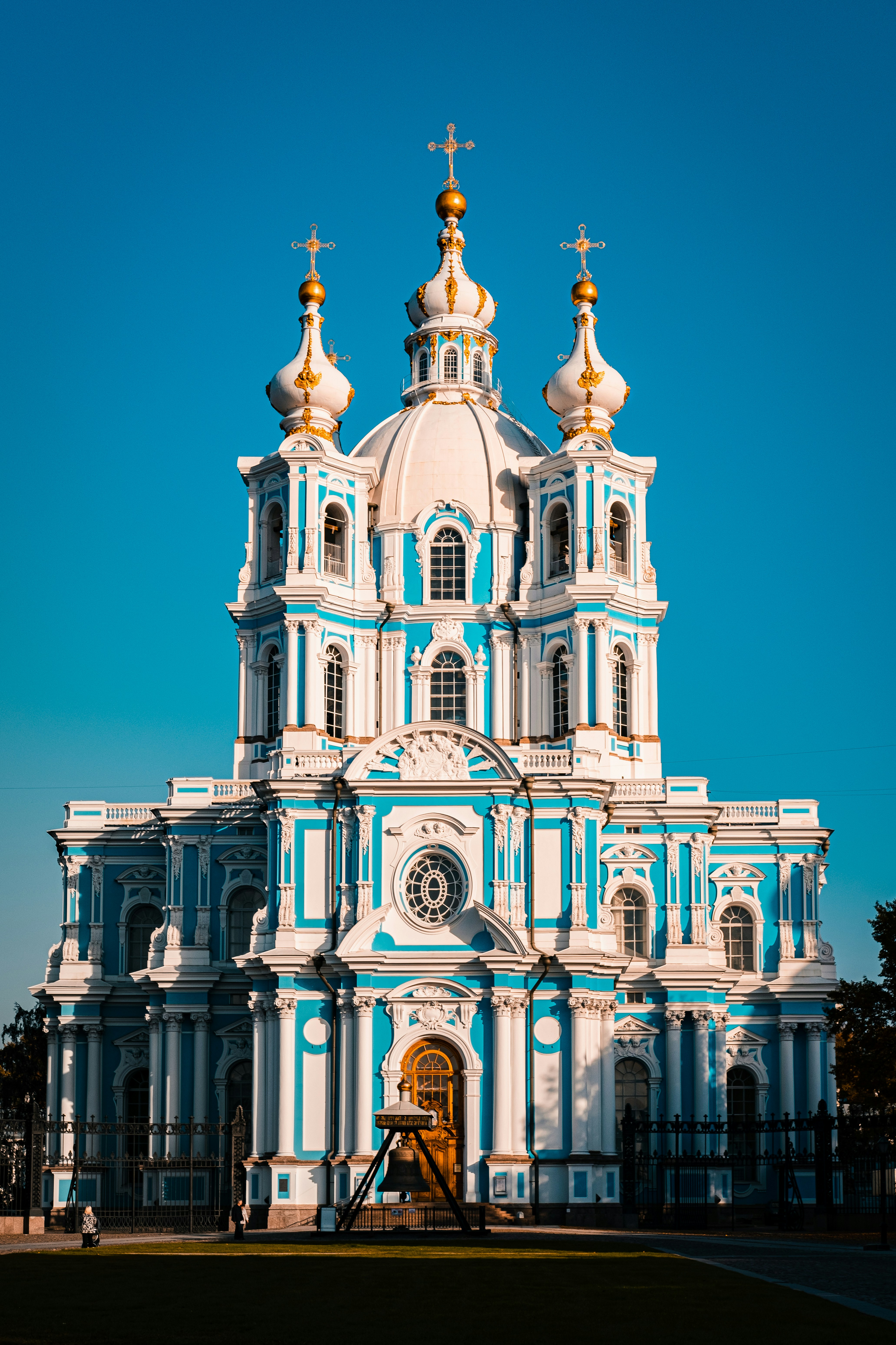 Azure Baroque Cathedral with Gilded Domes Against a Cobalt Sky