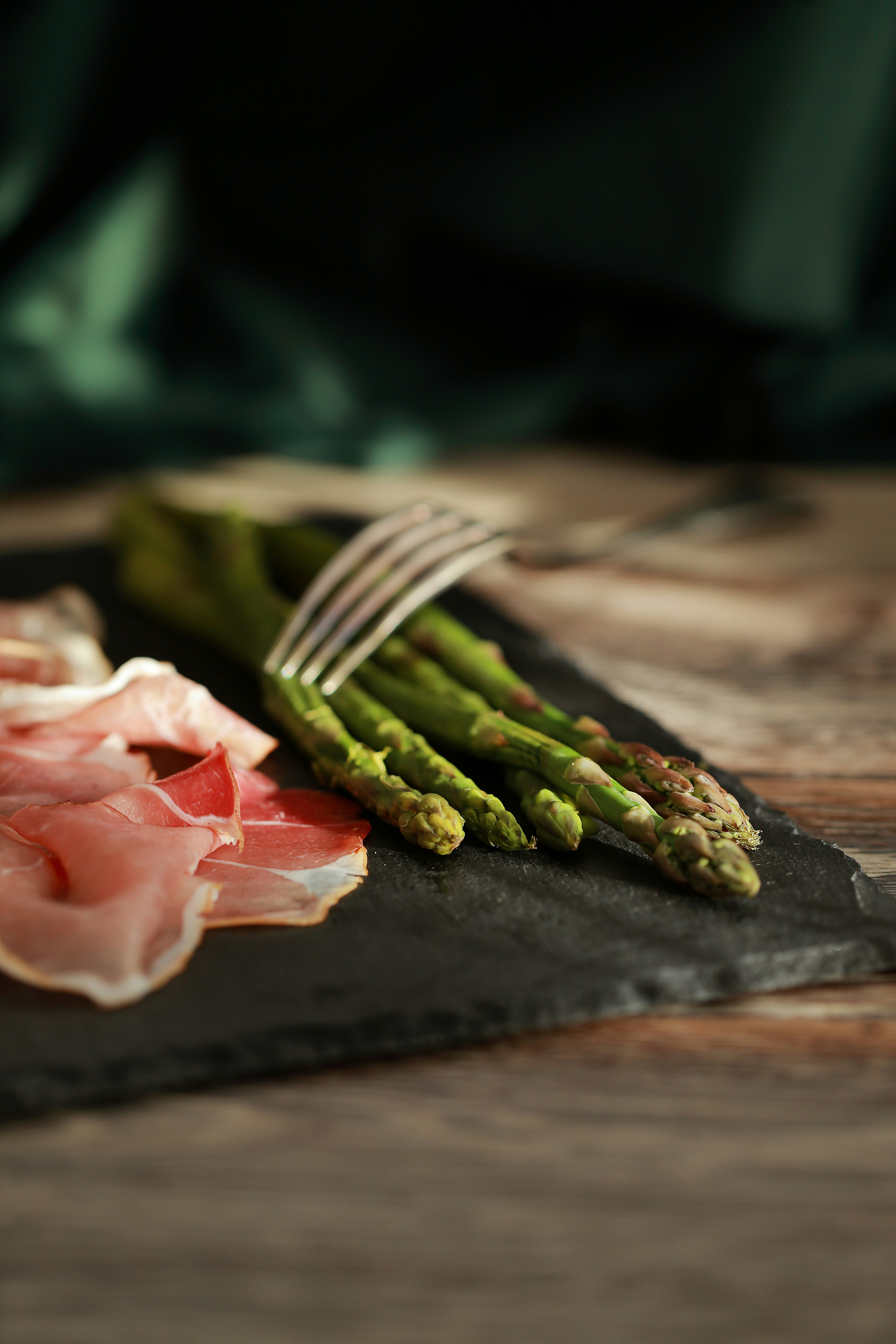 Slate Elegance: Asparagus Spears with Prosciutto