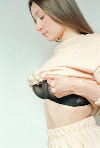 Soft Reveal in Cream Knit: A Quiet Studio Portrait of Contour and Light