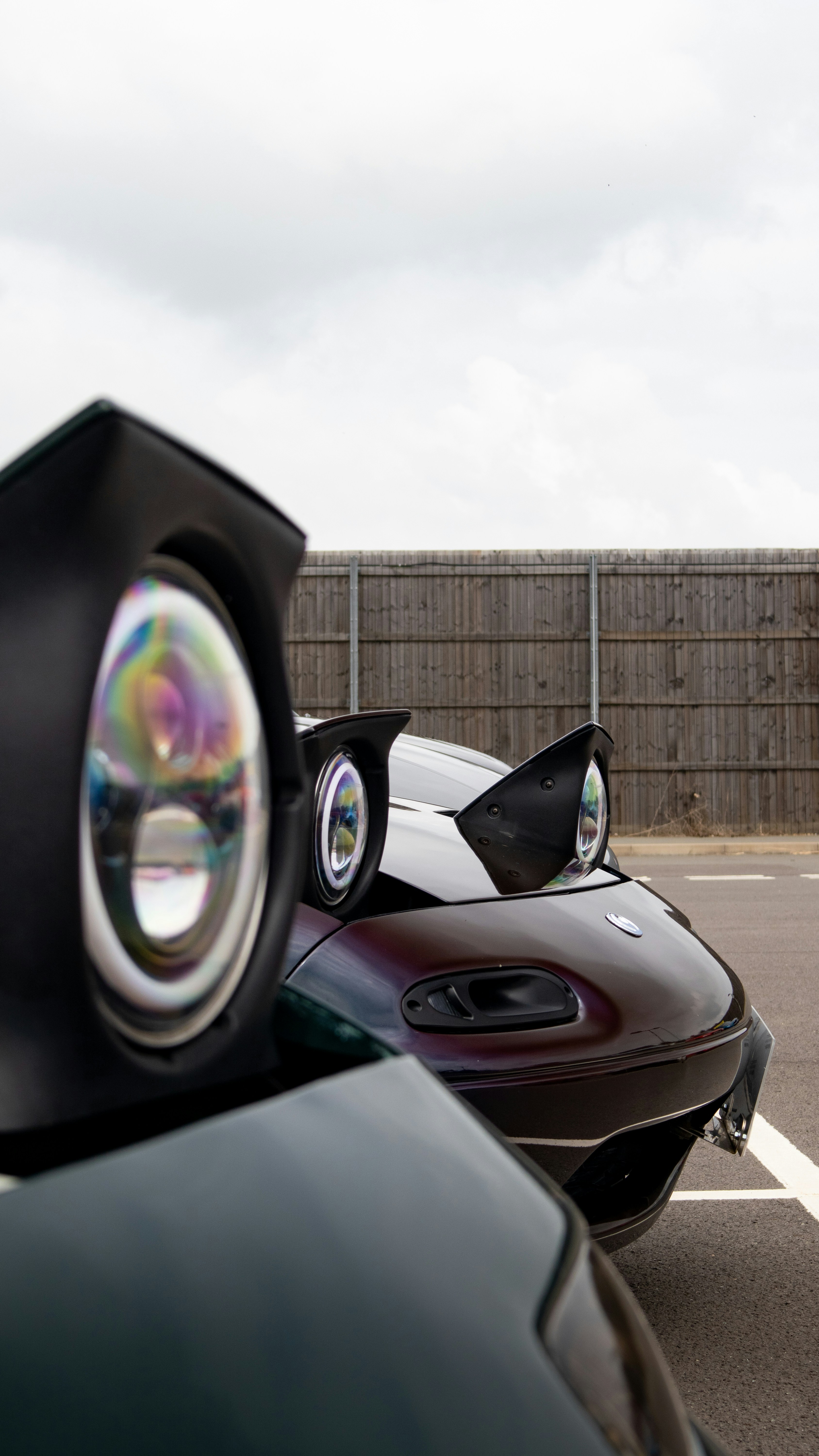 A close up of a car with a rear view mirror photo – Free Car Image on ...