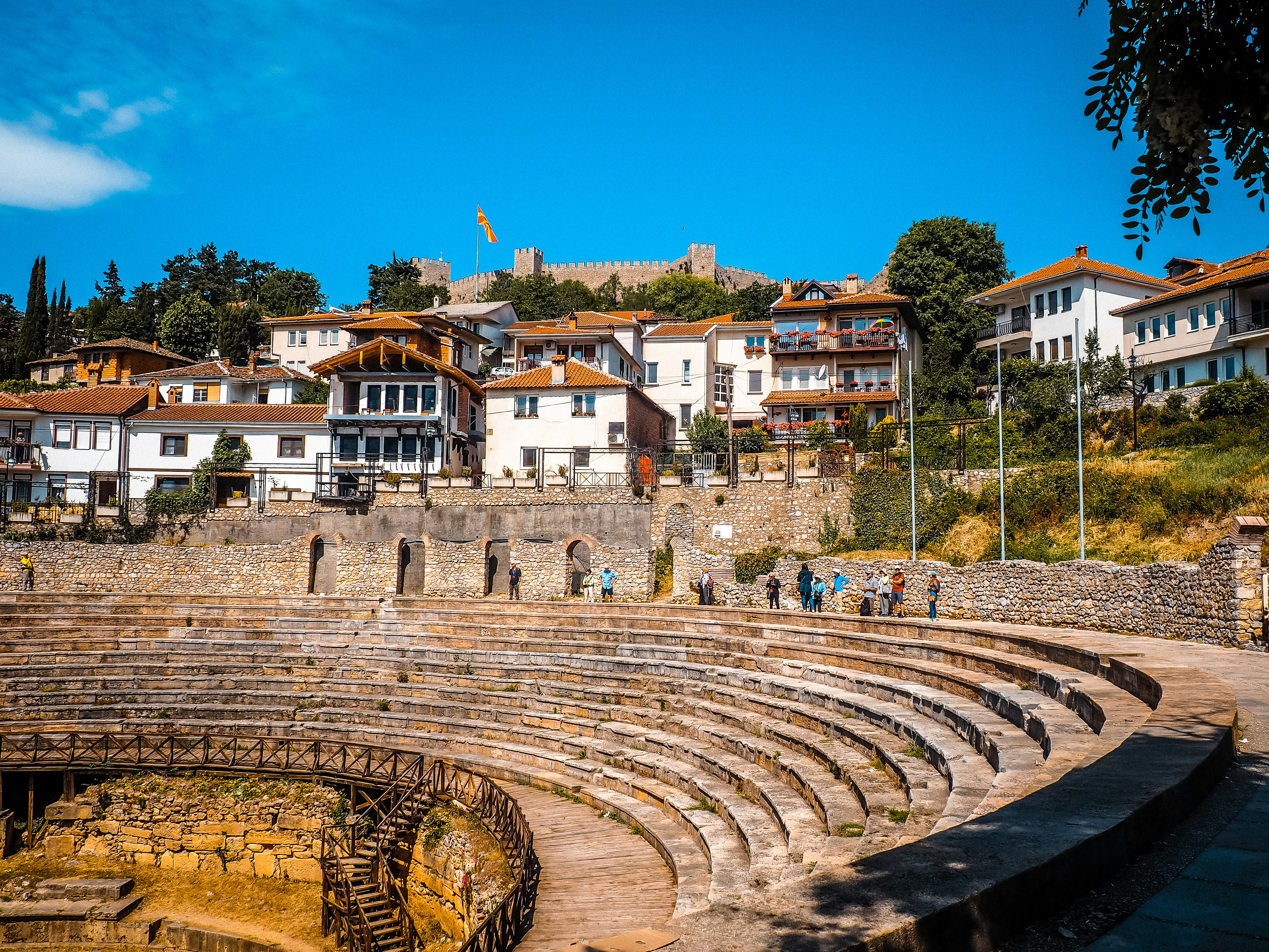 An old amphit sits in the middle of a town photo – Free Blue Image on ...