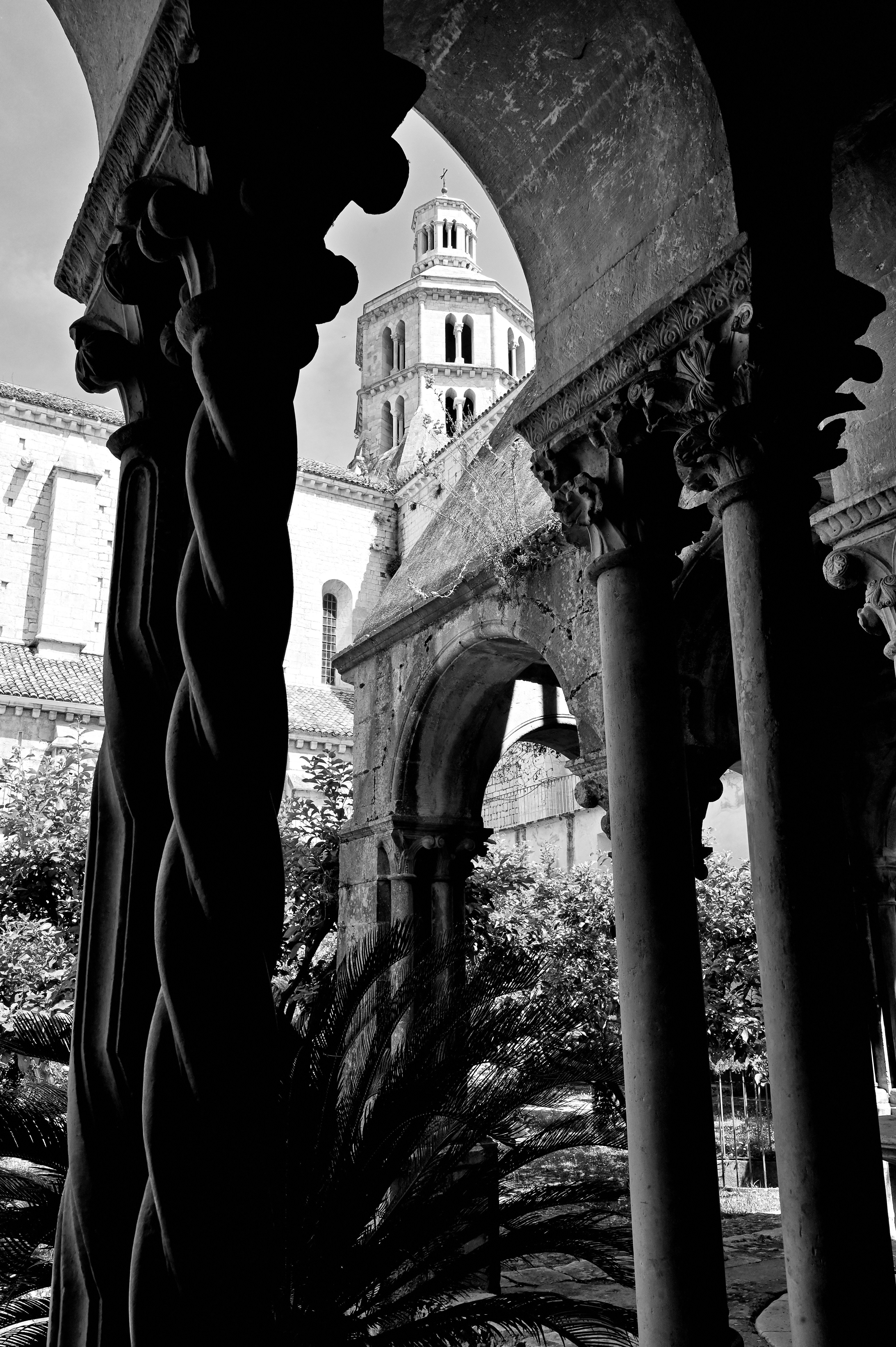 Gothic Arches Framing Medieval Tower
