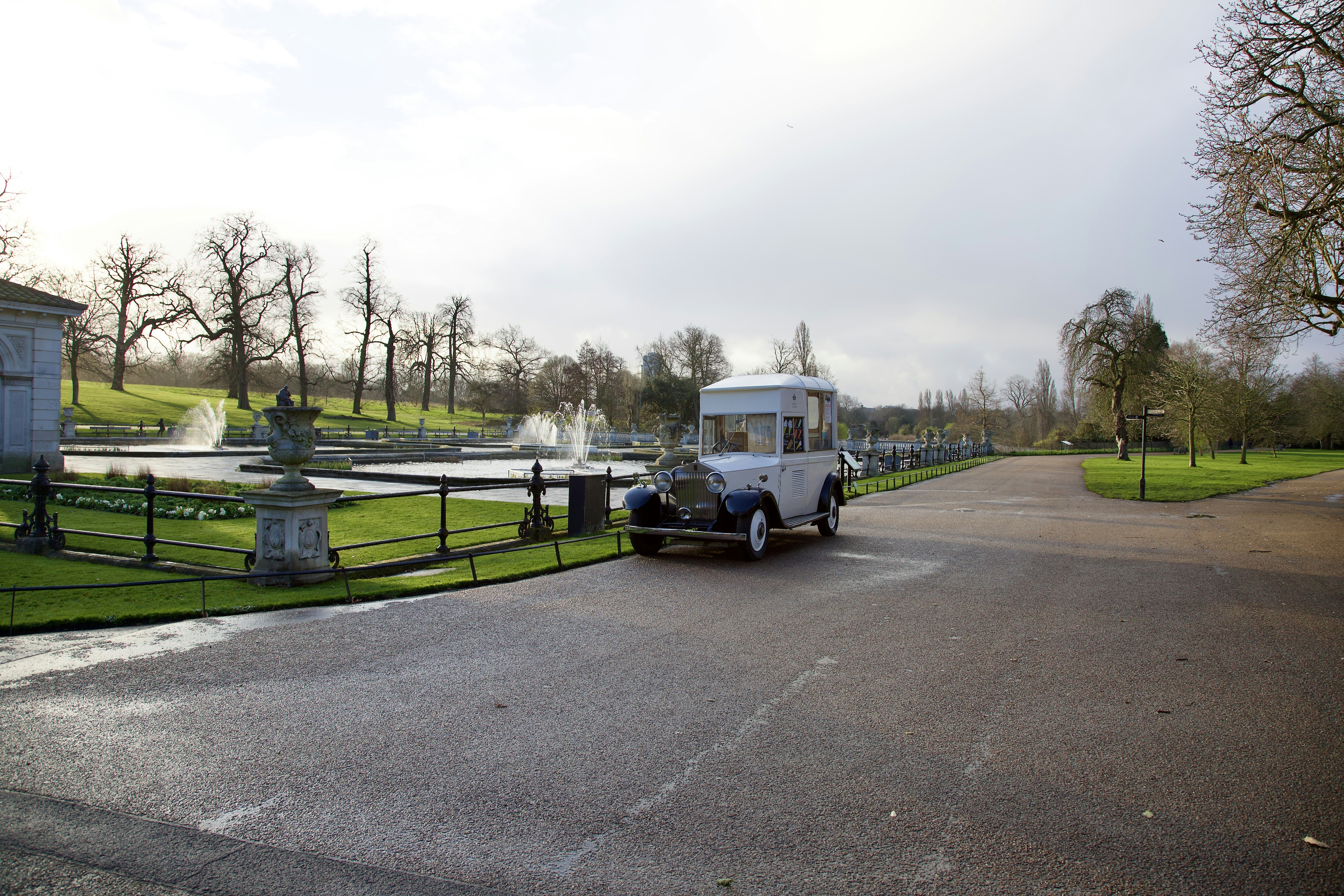 Midcentury Van Pauses at the Park's Quiet Fountain