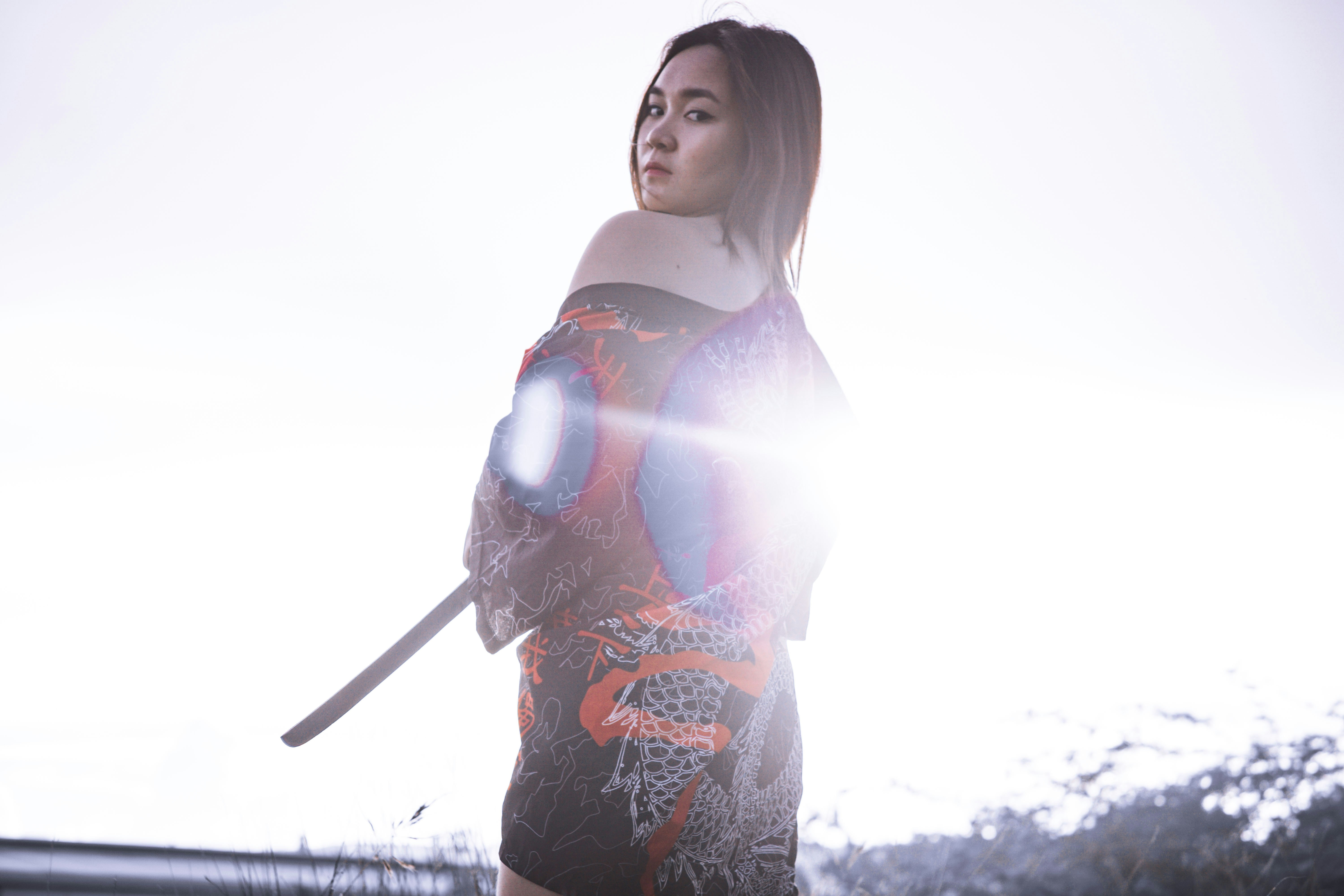 Backlit Portrait with a Silk Kimono Reference and Sword Accent
