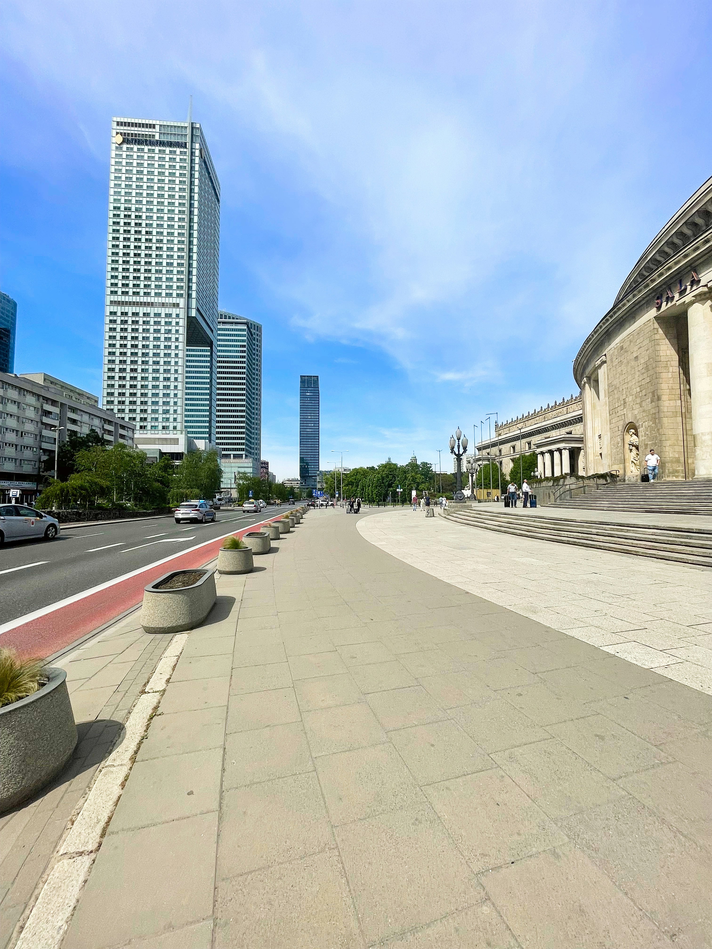 Skyline Confluence: A City Street Reaches for the Blue
