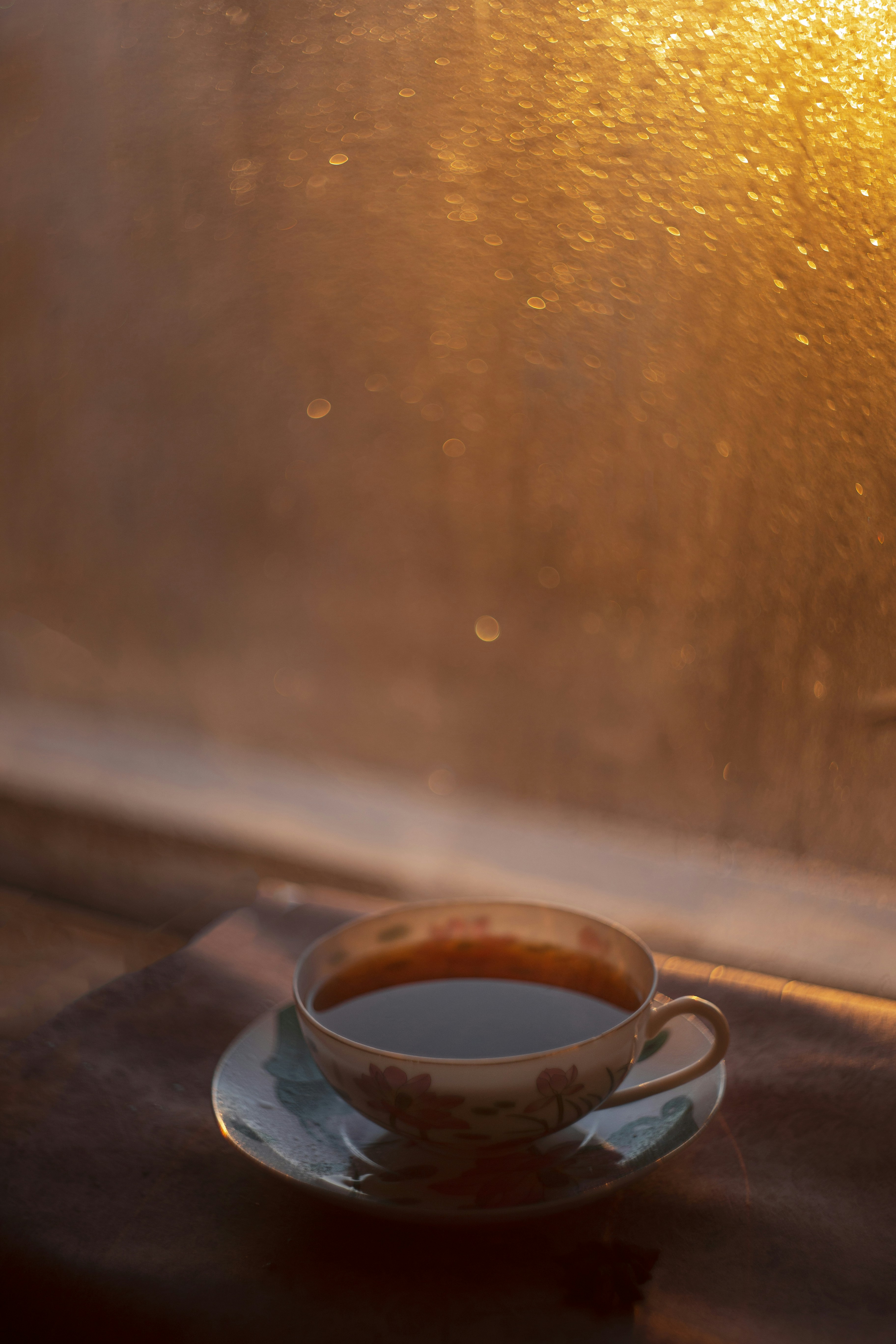 Ember Light Through Glass: A Quiet Tea Moment