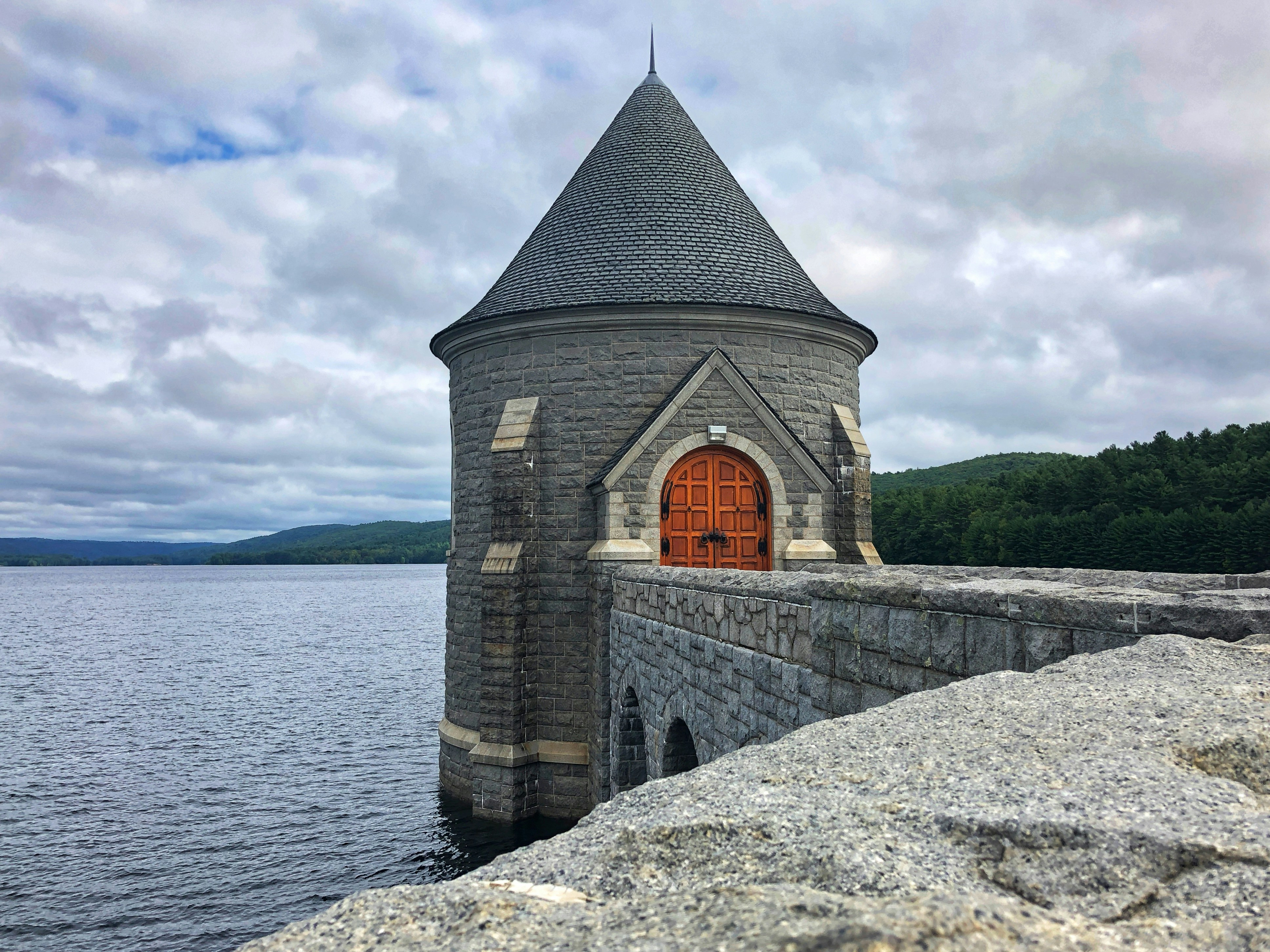 Stone Turret at Water's Edge: A Quiet Sentinel Guarding the Lake