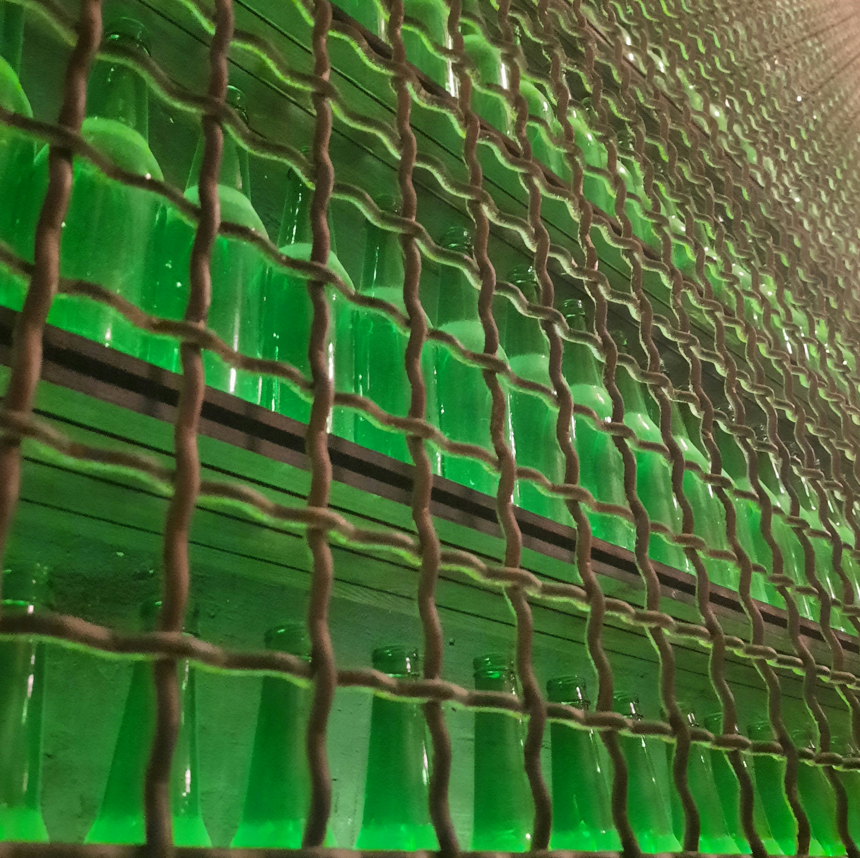 Green Netting Over Industrial Light: A Textured Macro
