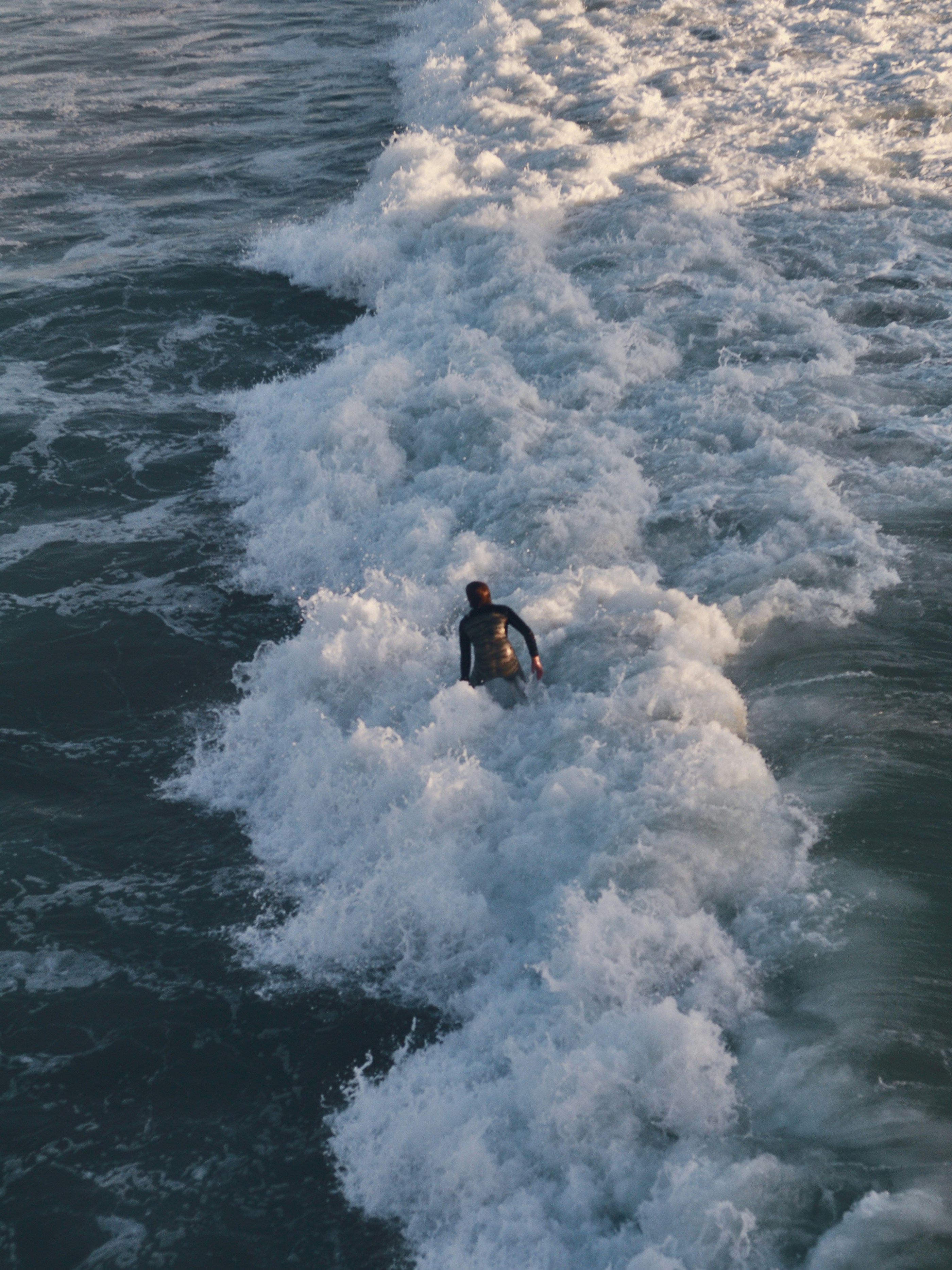 Midwake Rider: Tracing a Crest Through Turquoise Foam