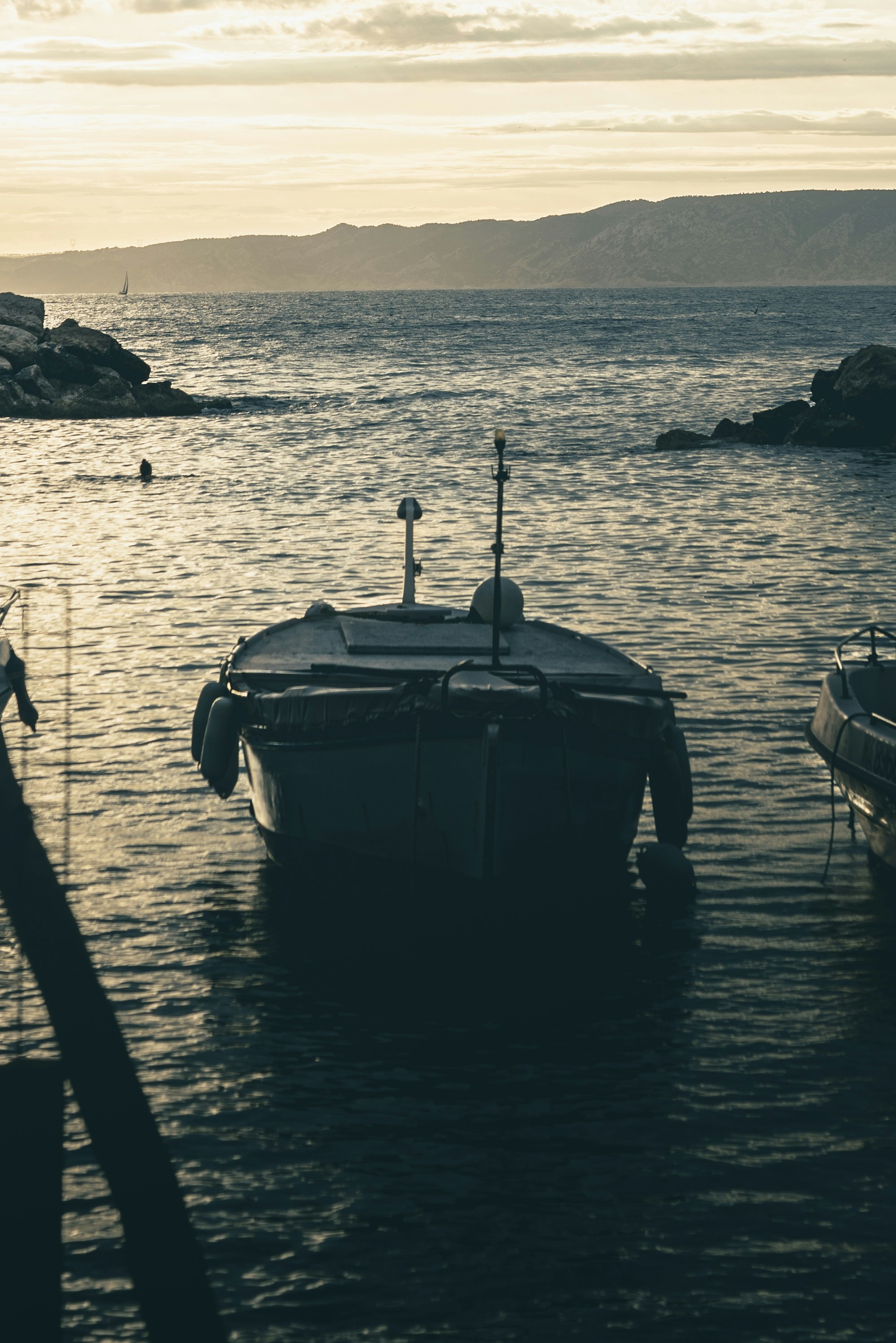 Amber Dusk Harbor: Boats Rest in Quiet Amber Waters