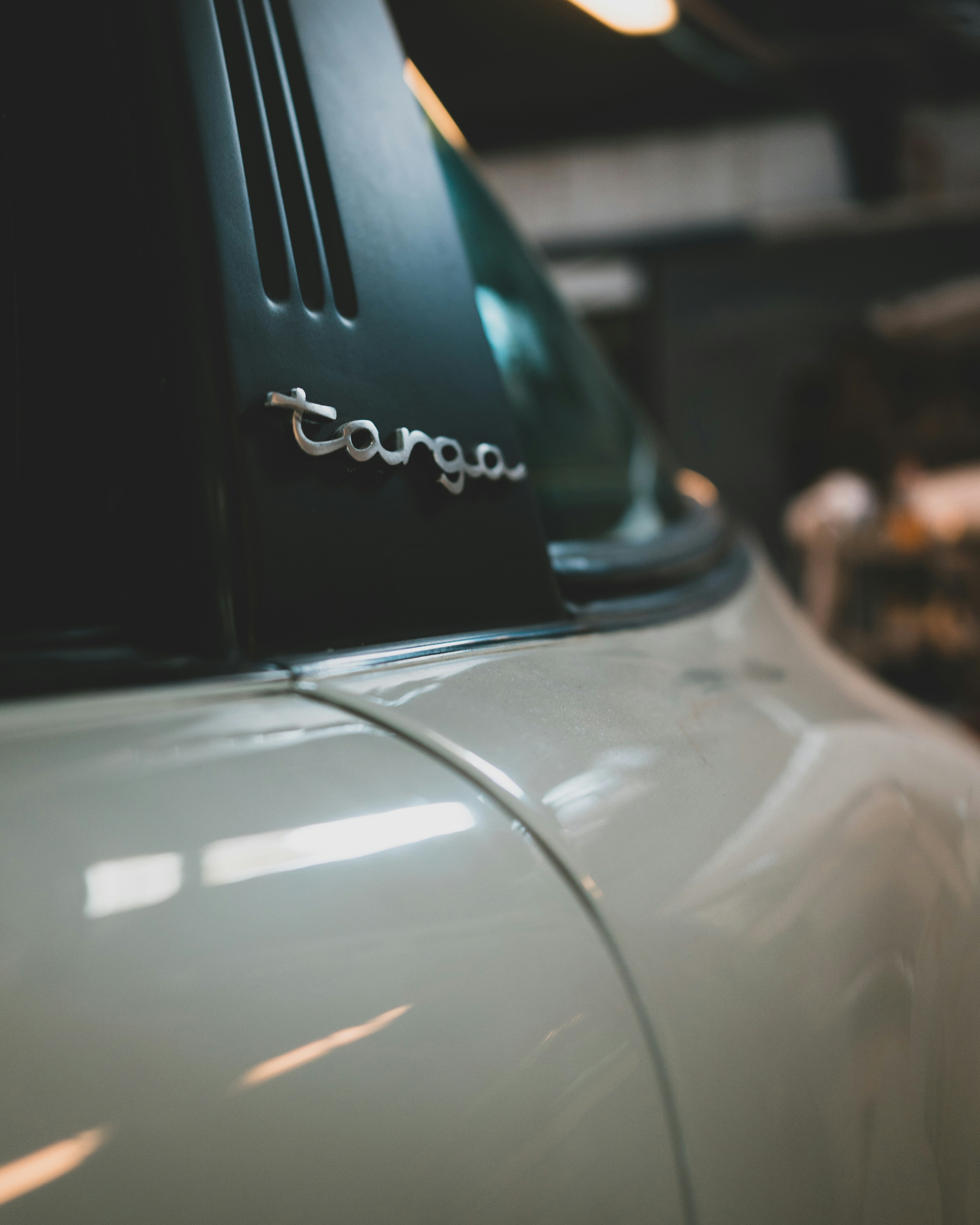 a close up of a car with a logo on it