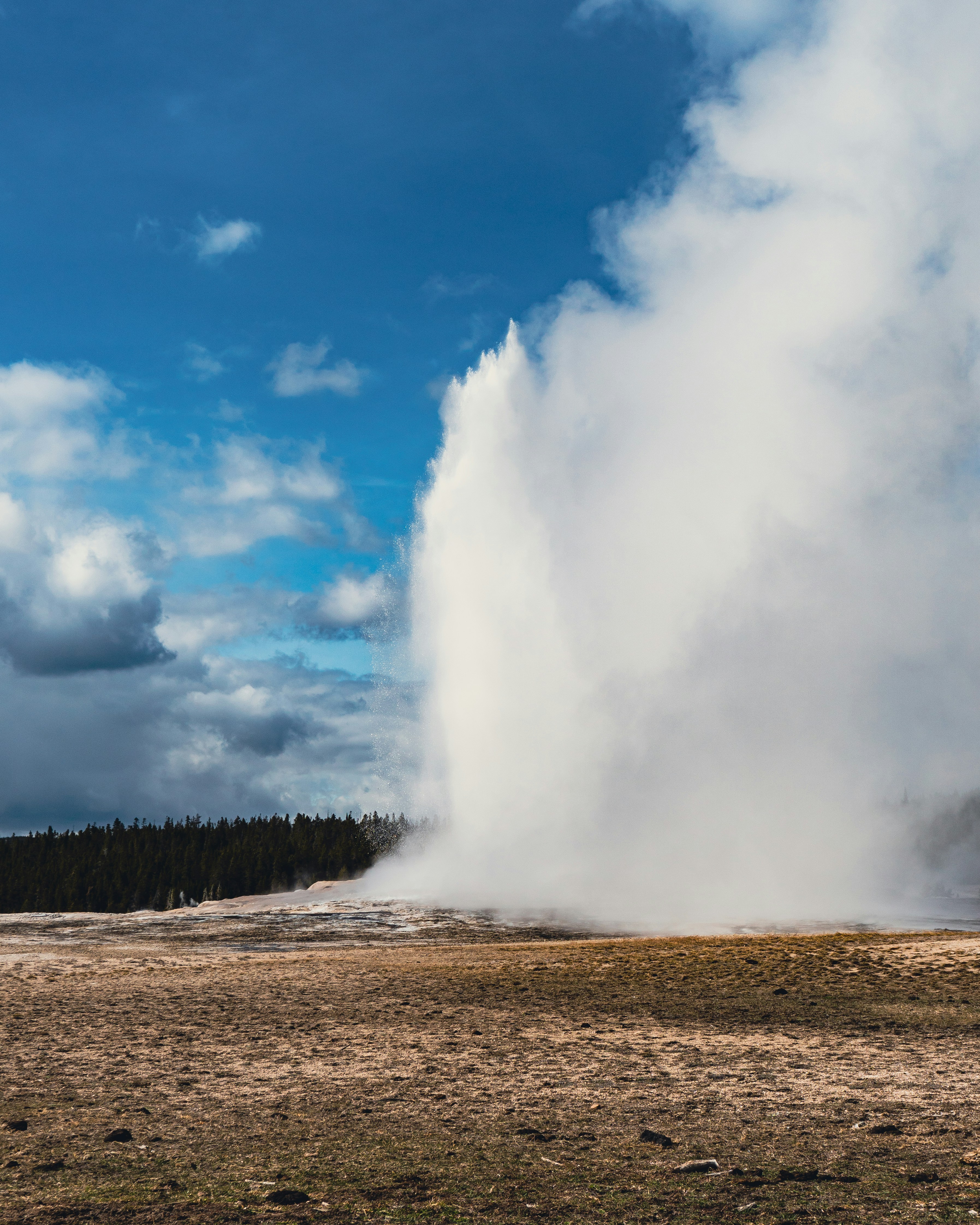 A large geyser spewing water into the sky photo – Free Wyoming Image on ...