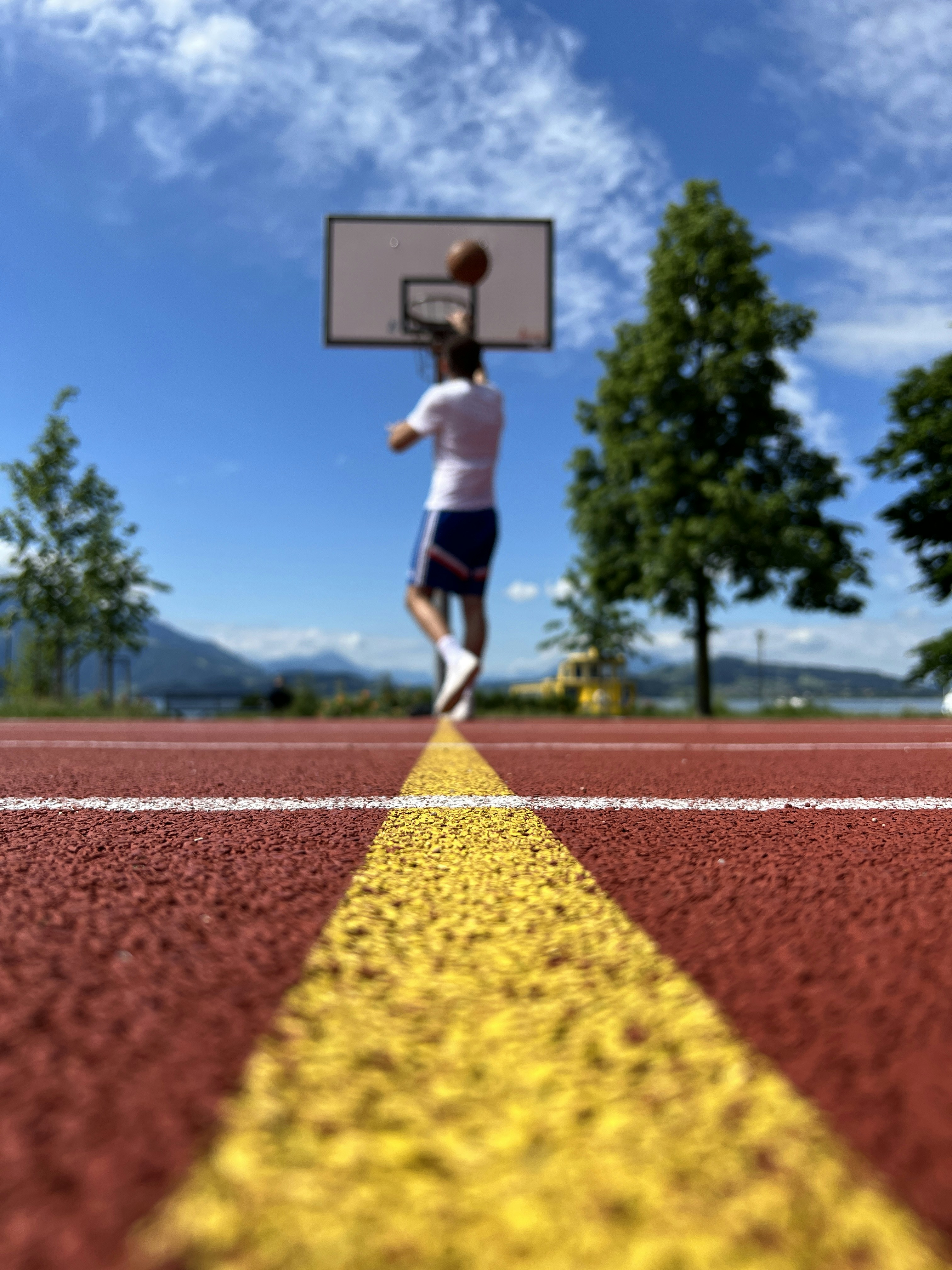 Line to the Rim: A Ground-Level Look at a Hoop Shot