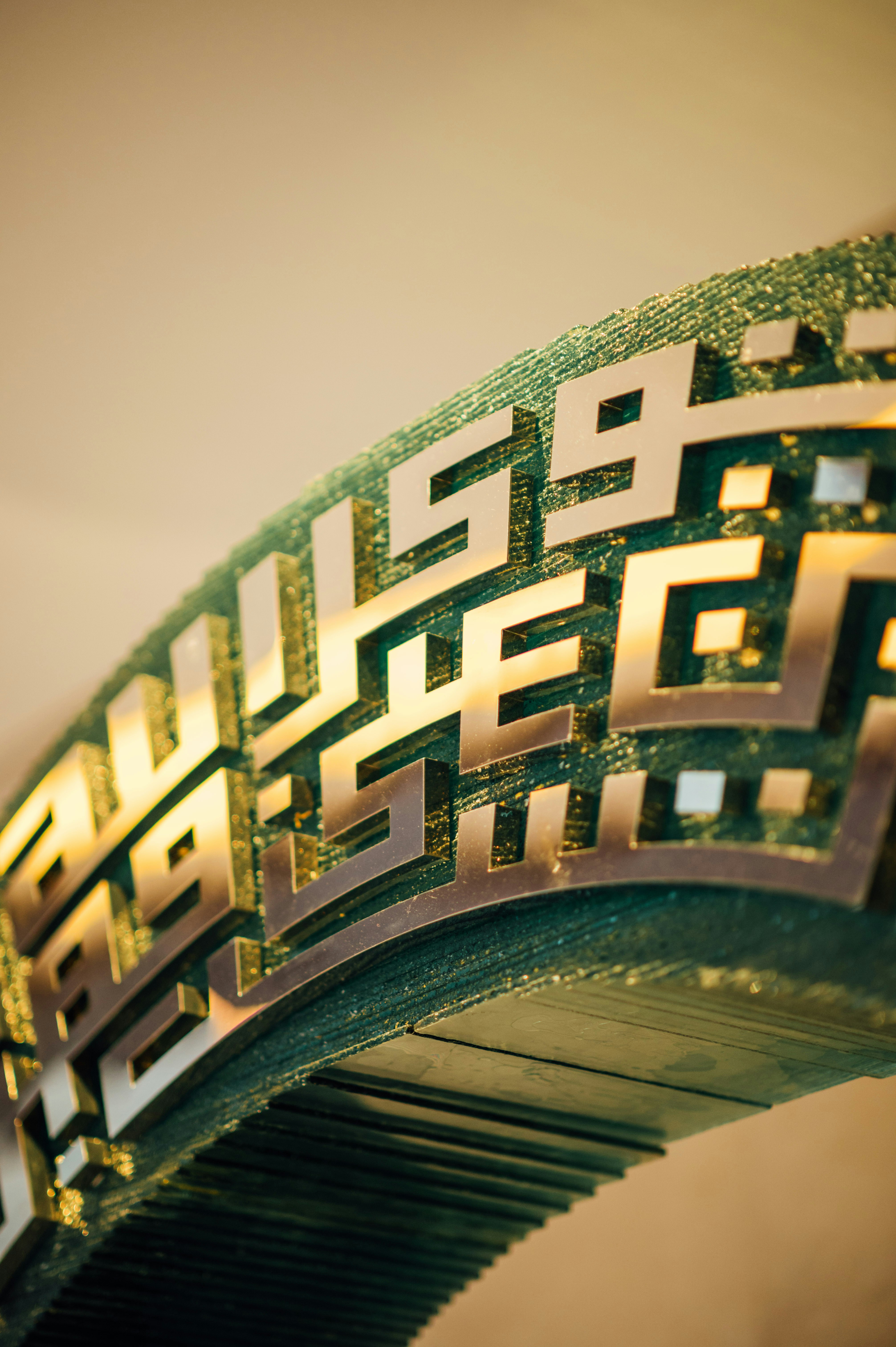 A close up of a circular metal object photo – Free Office building ...