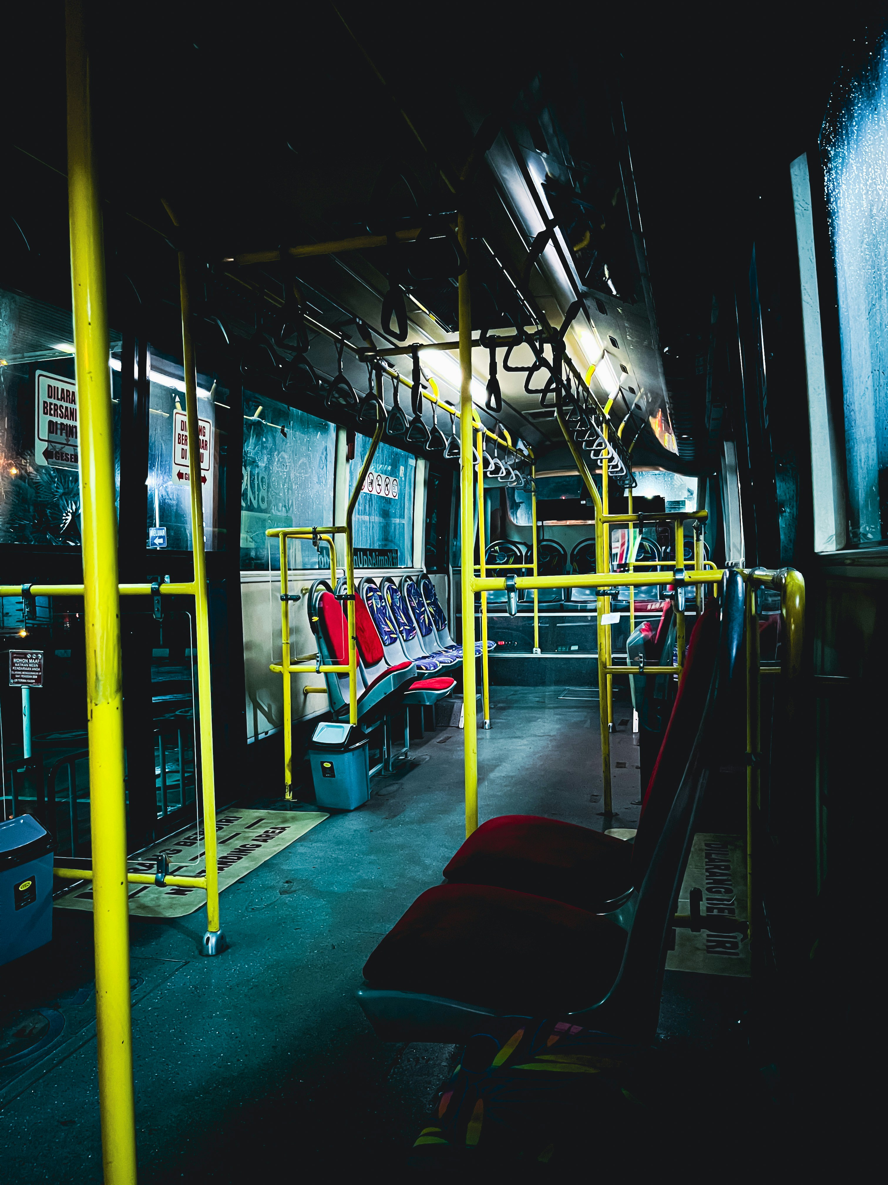 A bus with a bunch of seats inside of it photo – Free Android wallpaper ...