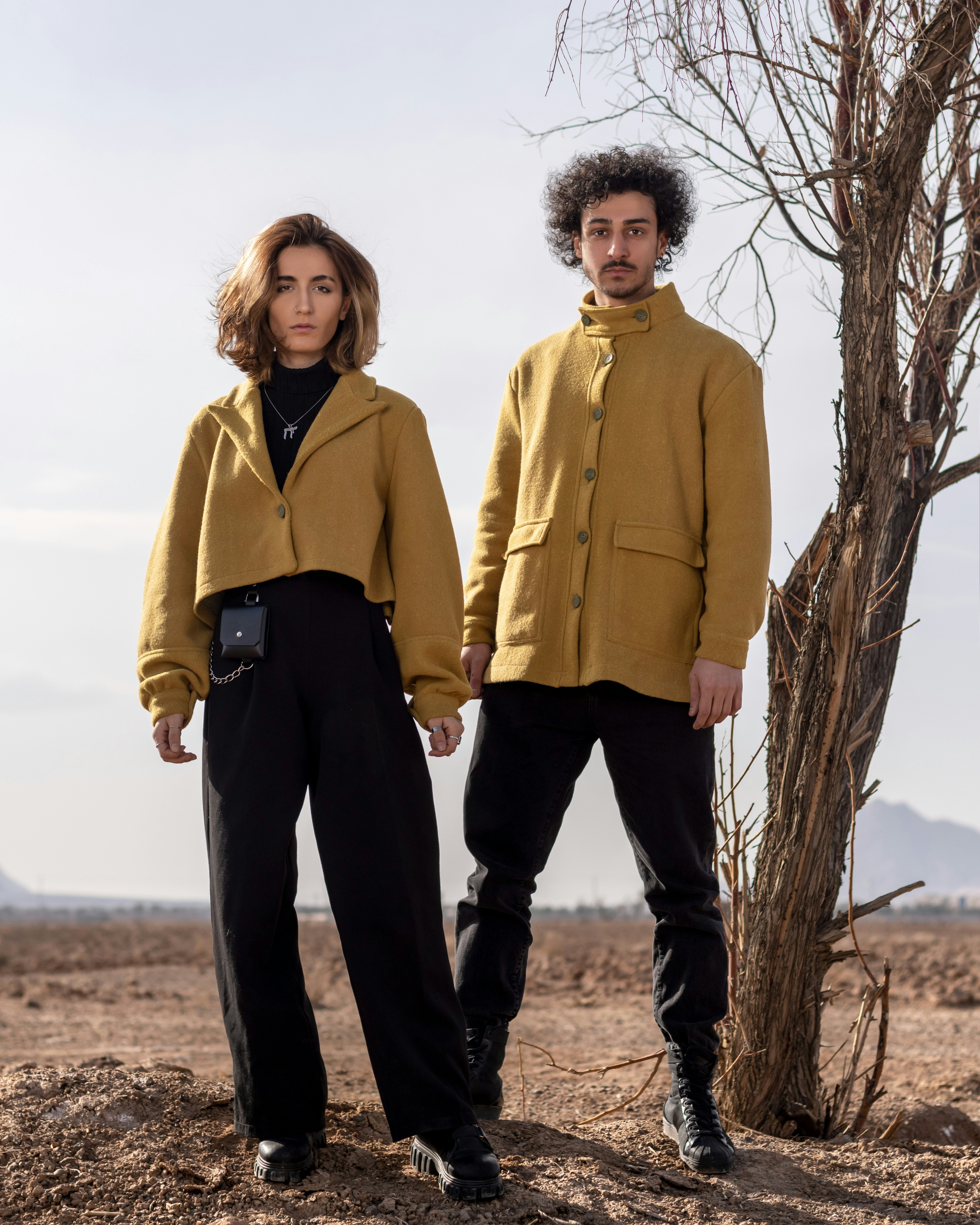 A couple of people standing next to a tree photo – Free Isfahan ...