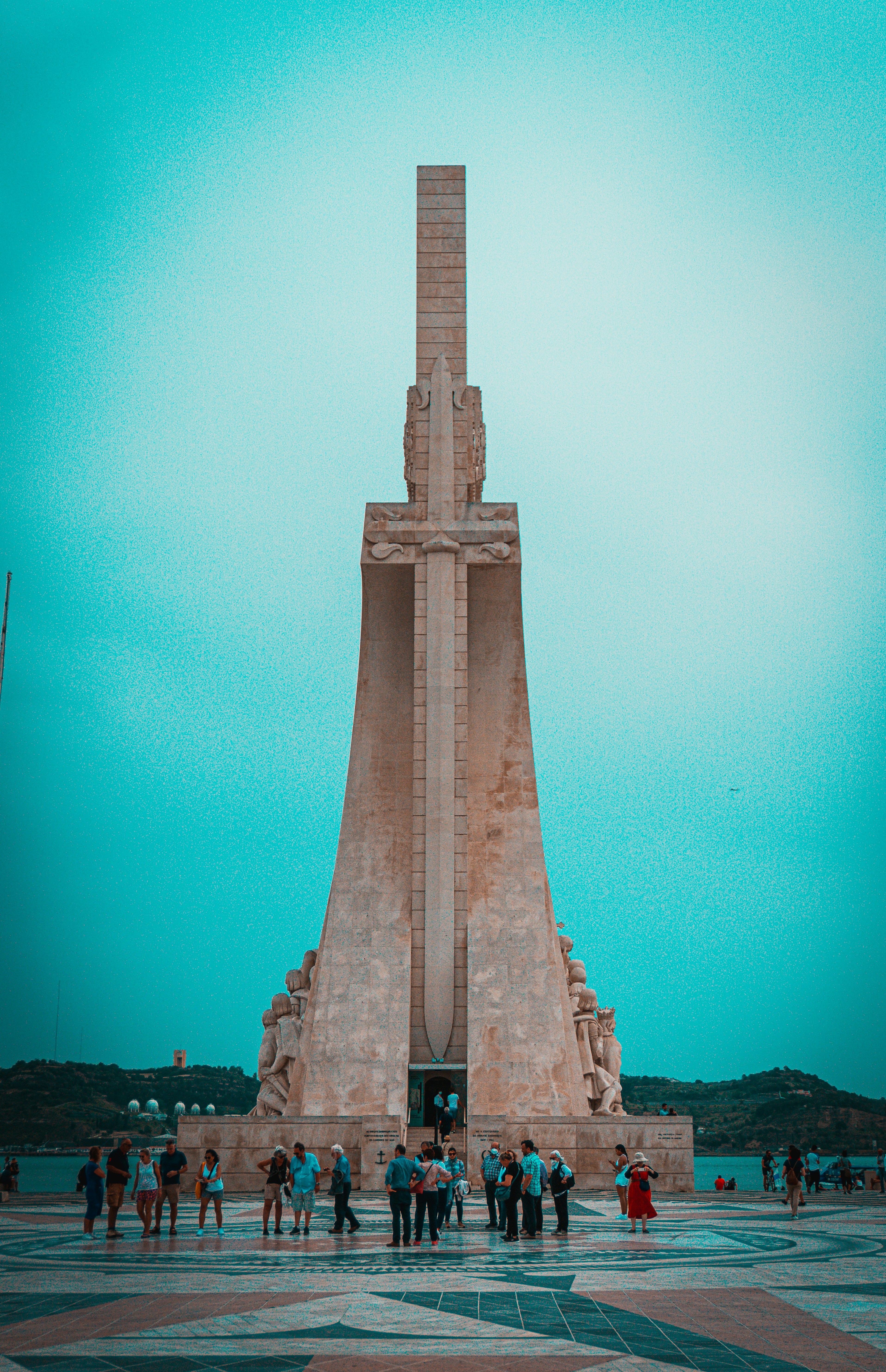 A group of people standing in front of a monument photo – Free Lisbon ...