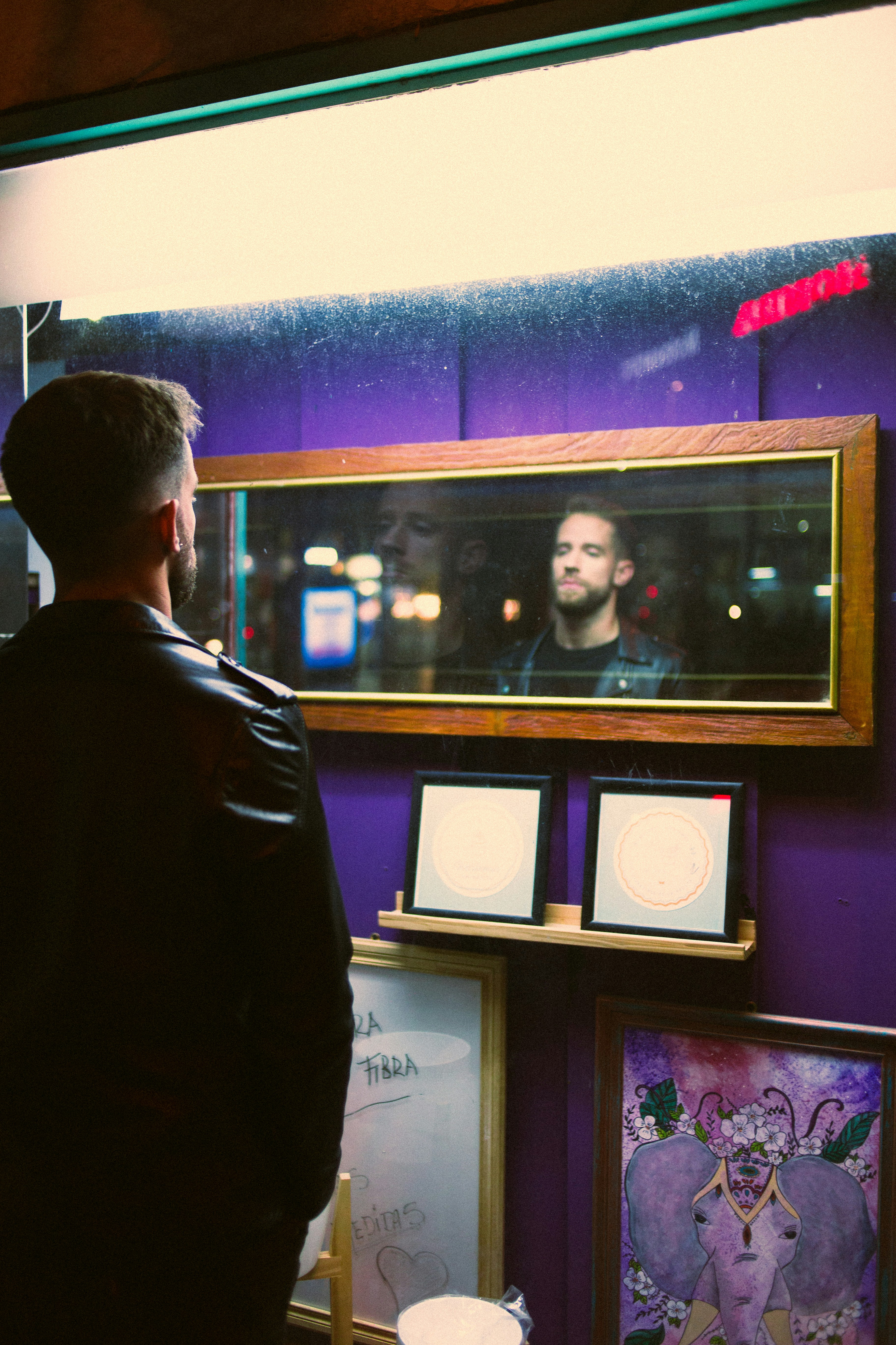 Reflected in the Frame: Portrait Framed by Velvet Purple