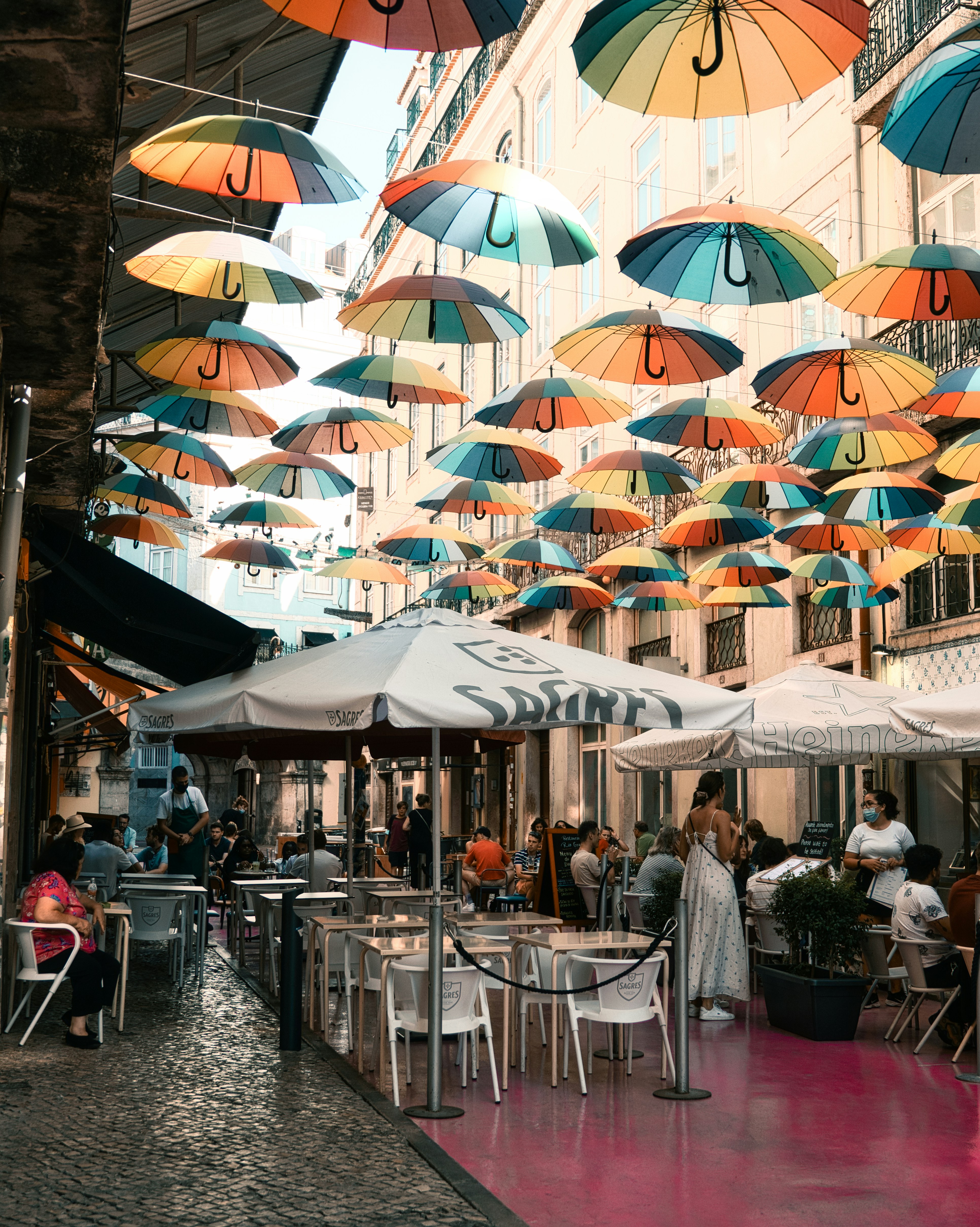 A bunch of umbrellas that are hanging in the air photo – Free Lisbon ...