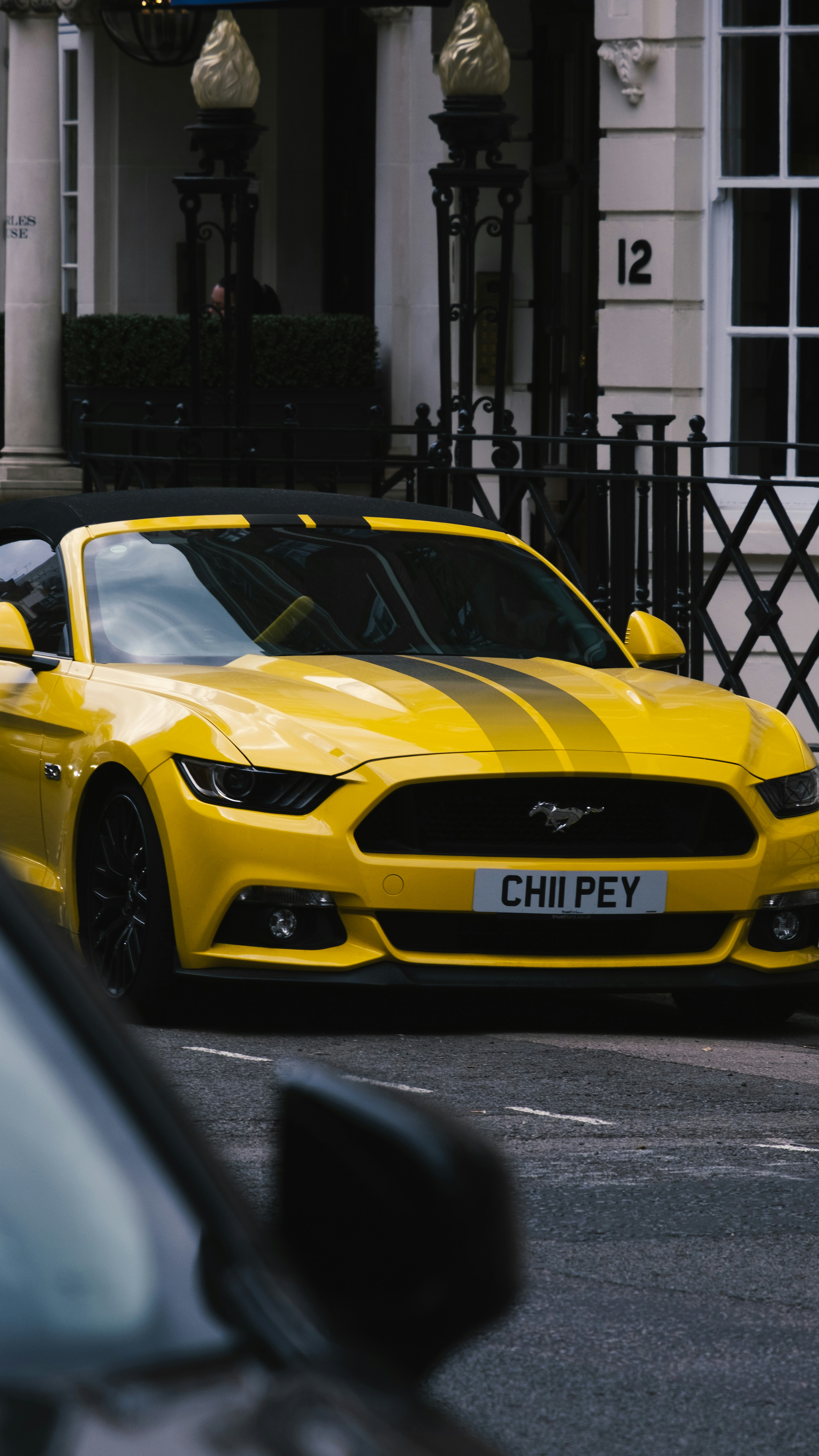 Georgian Street Neon Pony: A Yellow Mustang Guards the London Road