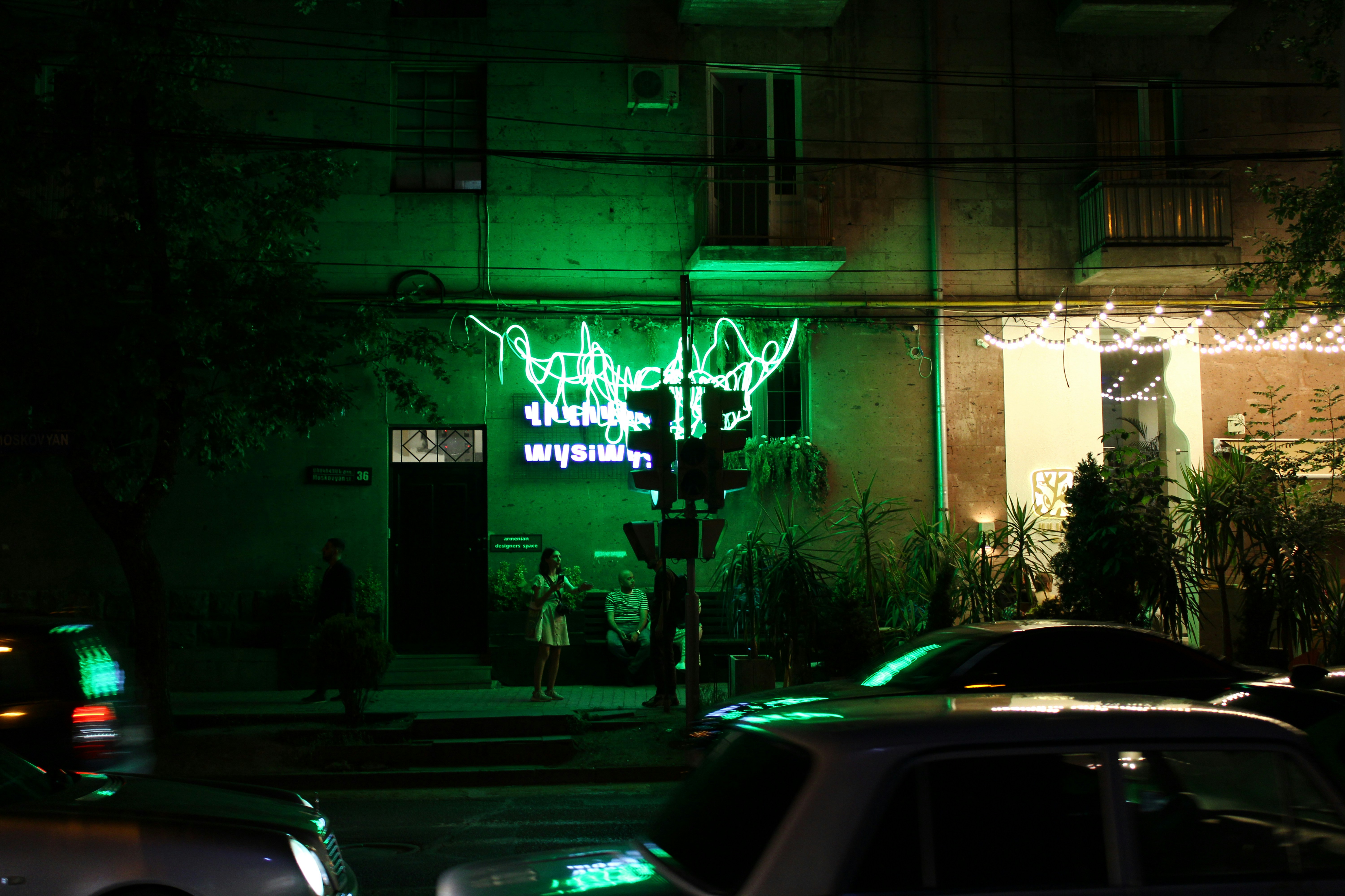 Neon Glow Over a Night-Street Café