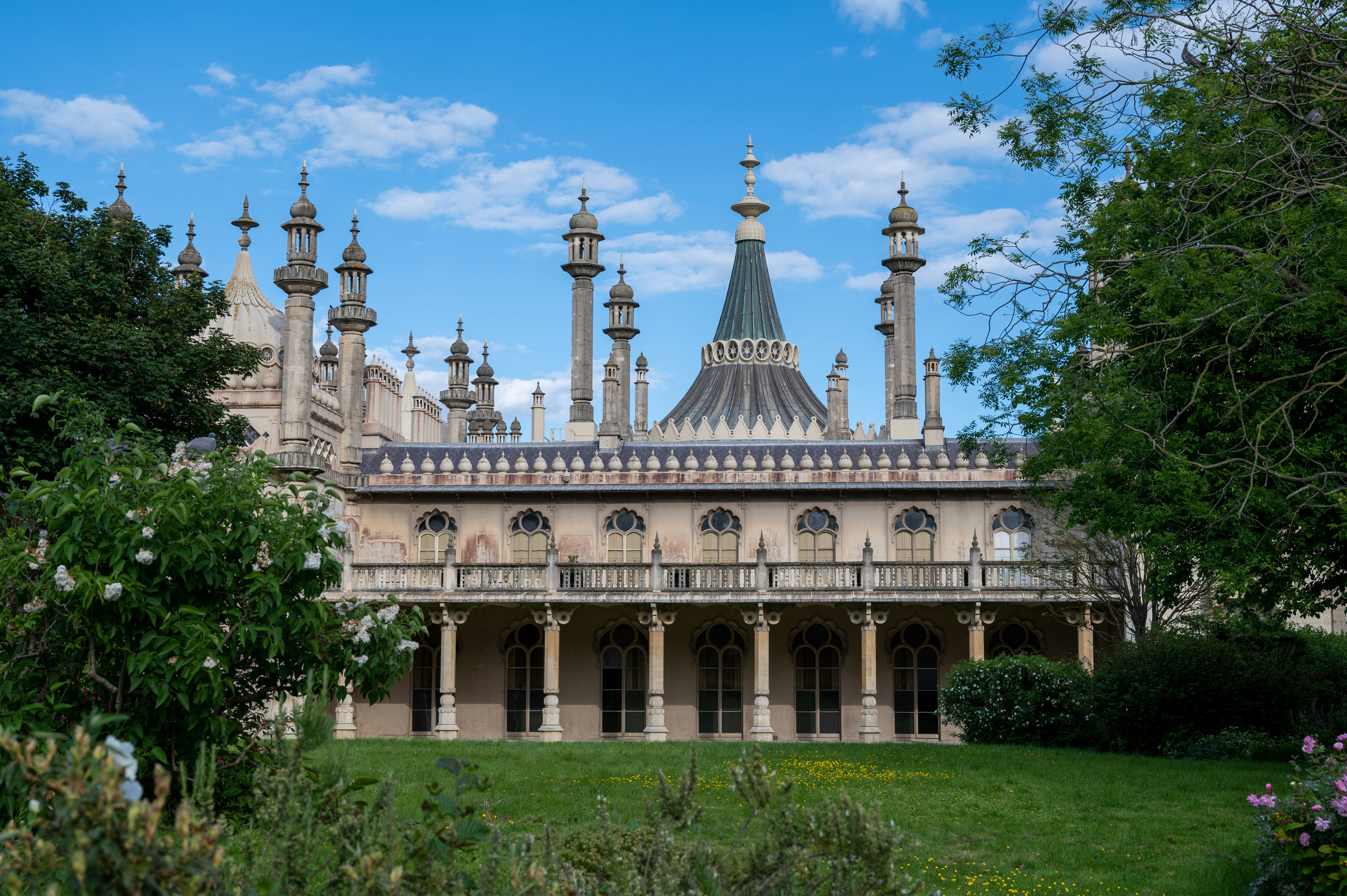 a large building with many towers and windows