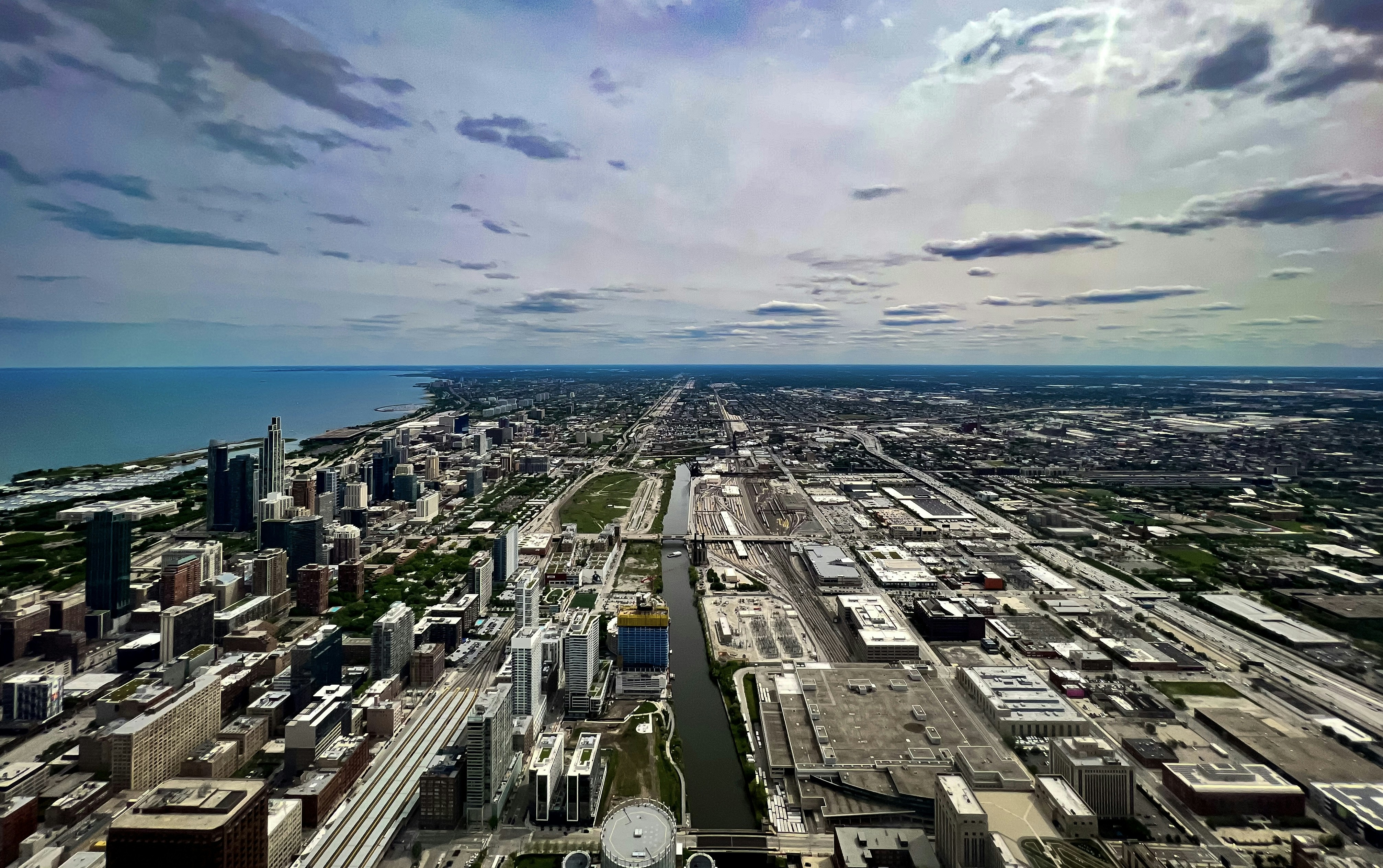 An aerial view of a city and the ocean photo – Free Chicago Image on ...