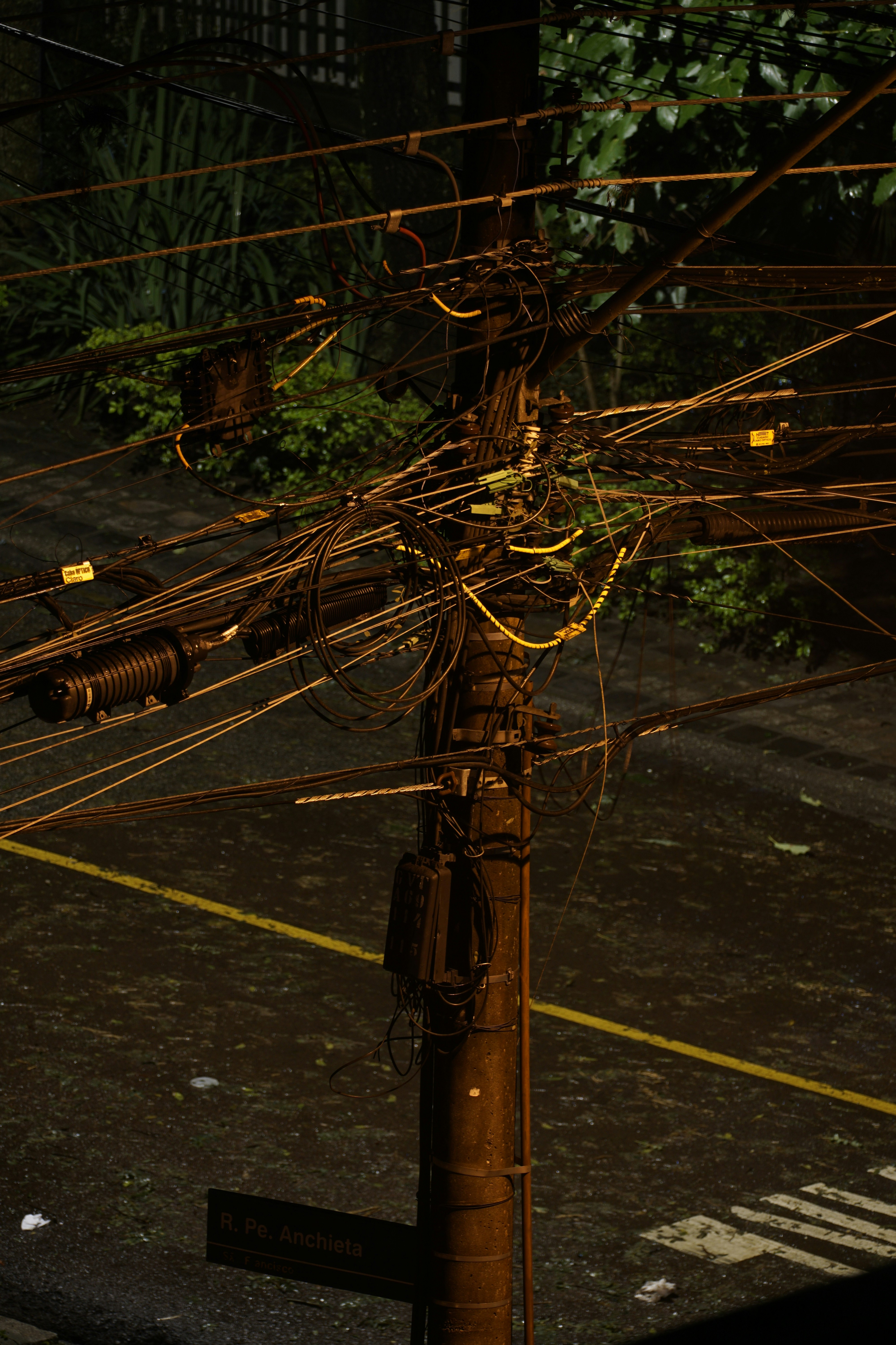 A telephone pole with many wires attached to it photo – Free Cyberpunk ...