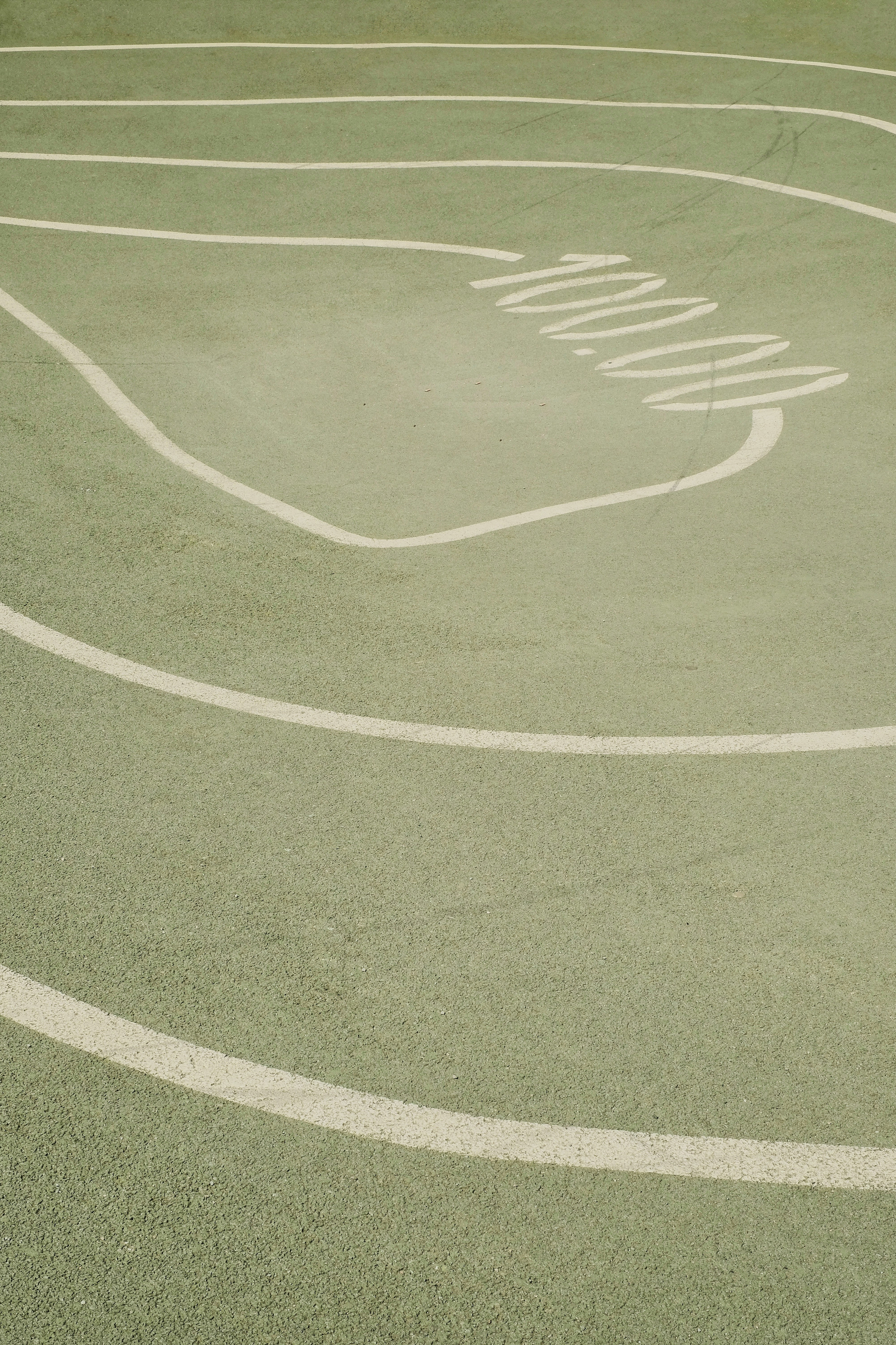 A person riding a skateboard on a court photo – Free Field Image on ...