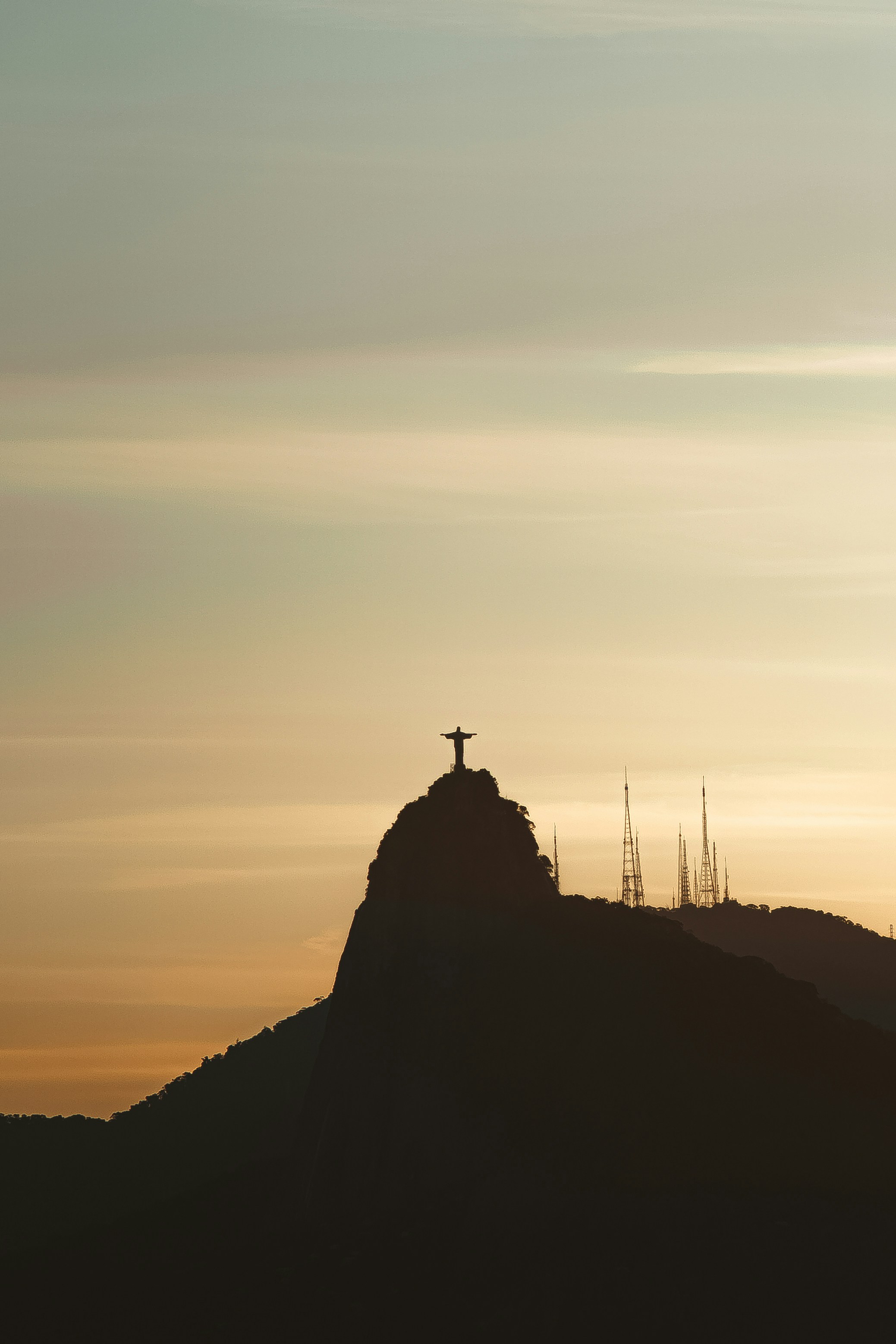 Dusk Silhouette on Corcovado: Christ the Redeemer Watches Rio's Quiet Horizon