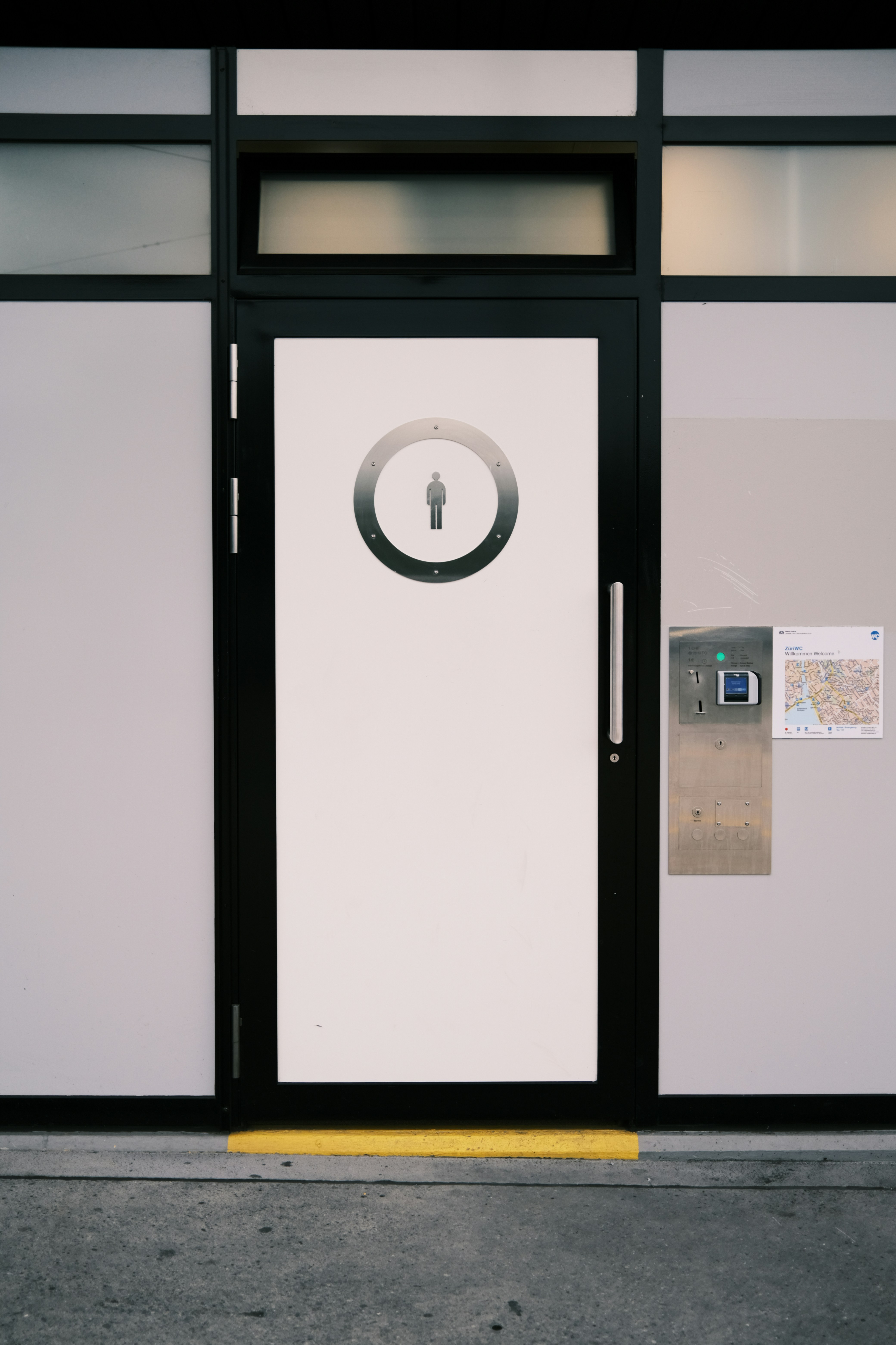 a white door with a black handle on it