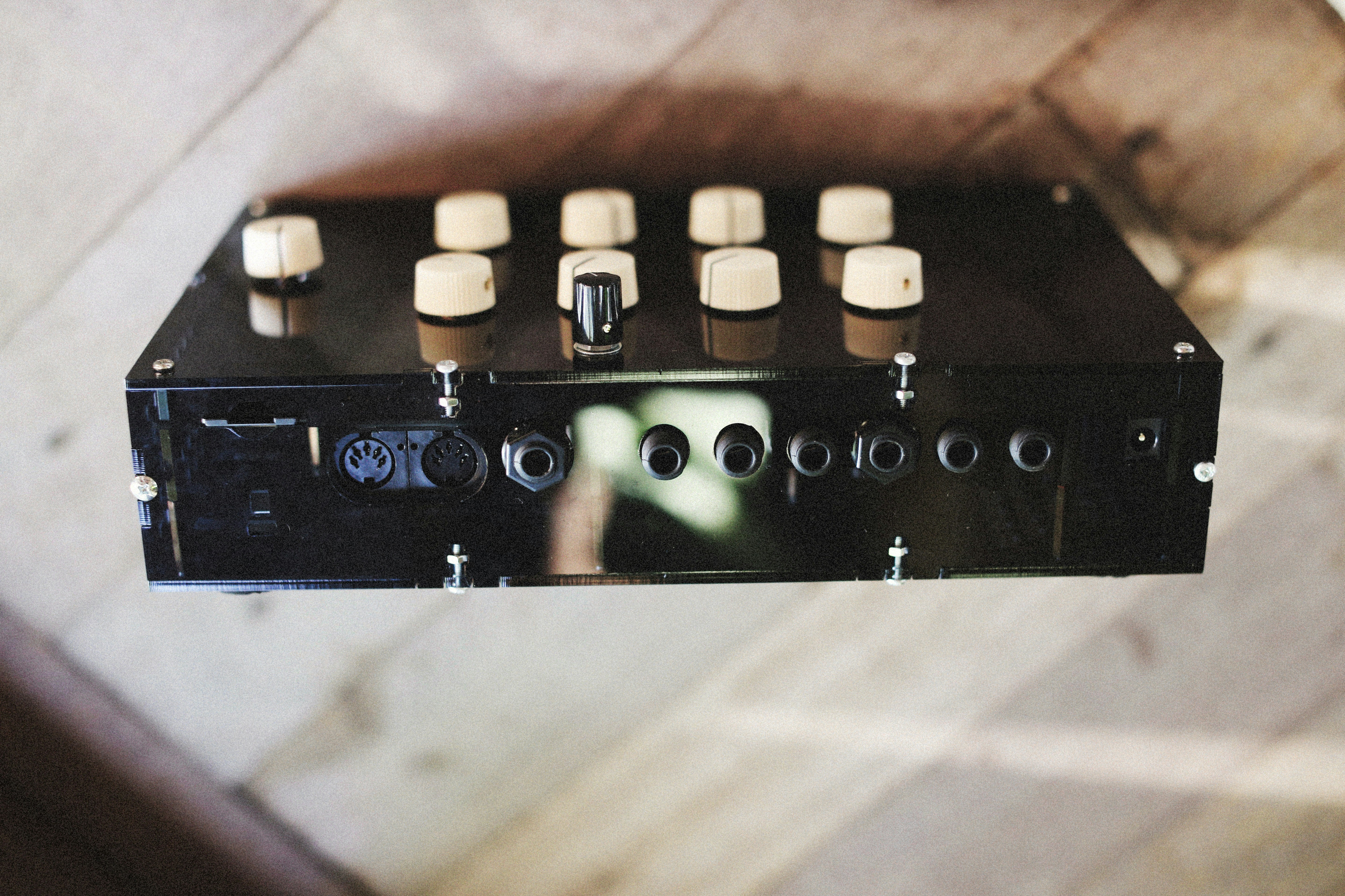 Echoes of a Silent Console: A Vintage Interface in a Dim Space