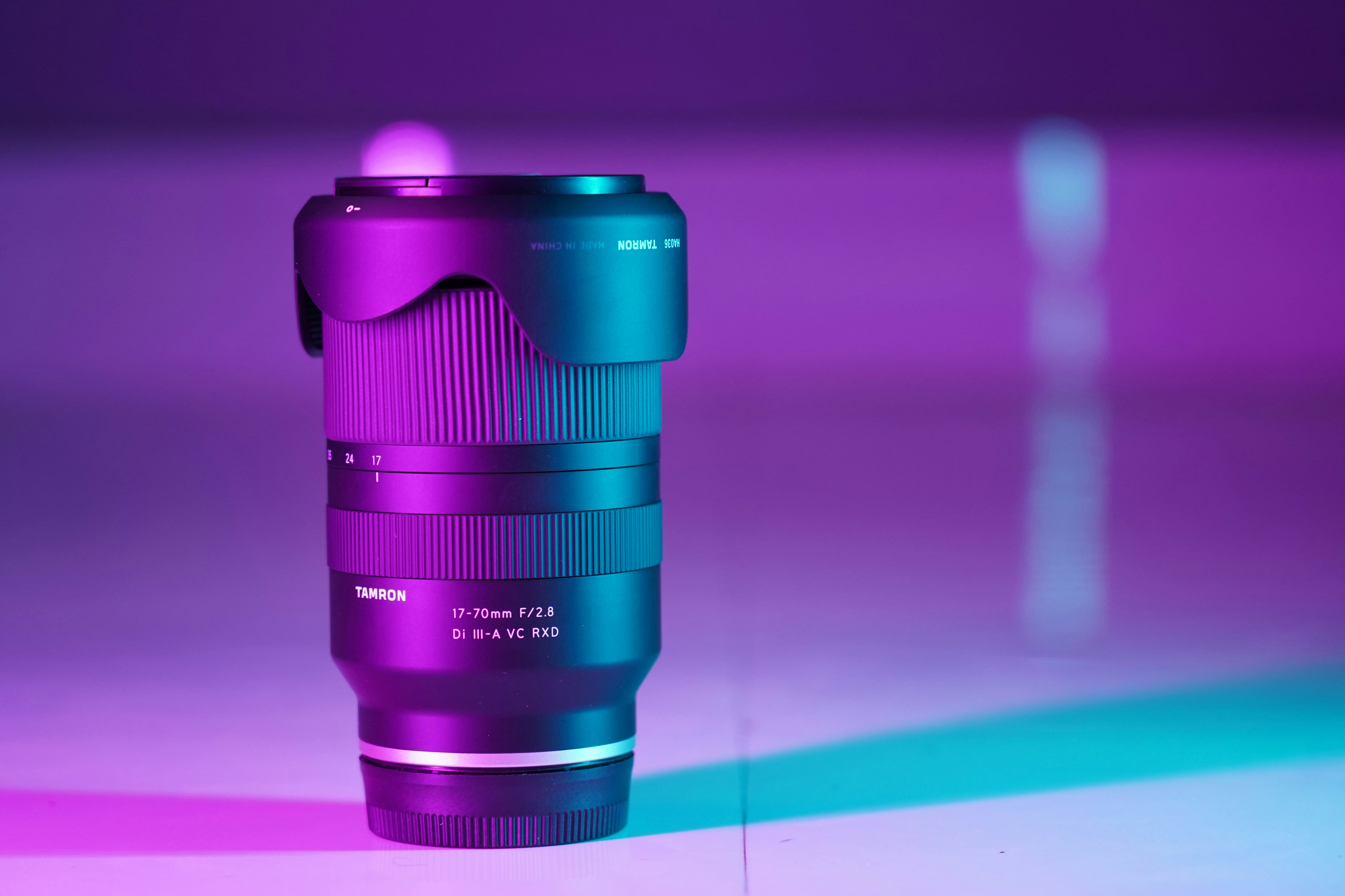A camera lens sitting on top of a table photo – Free Camera lens Image ...