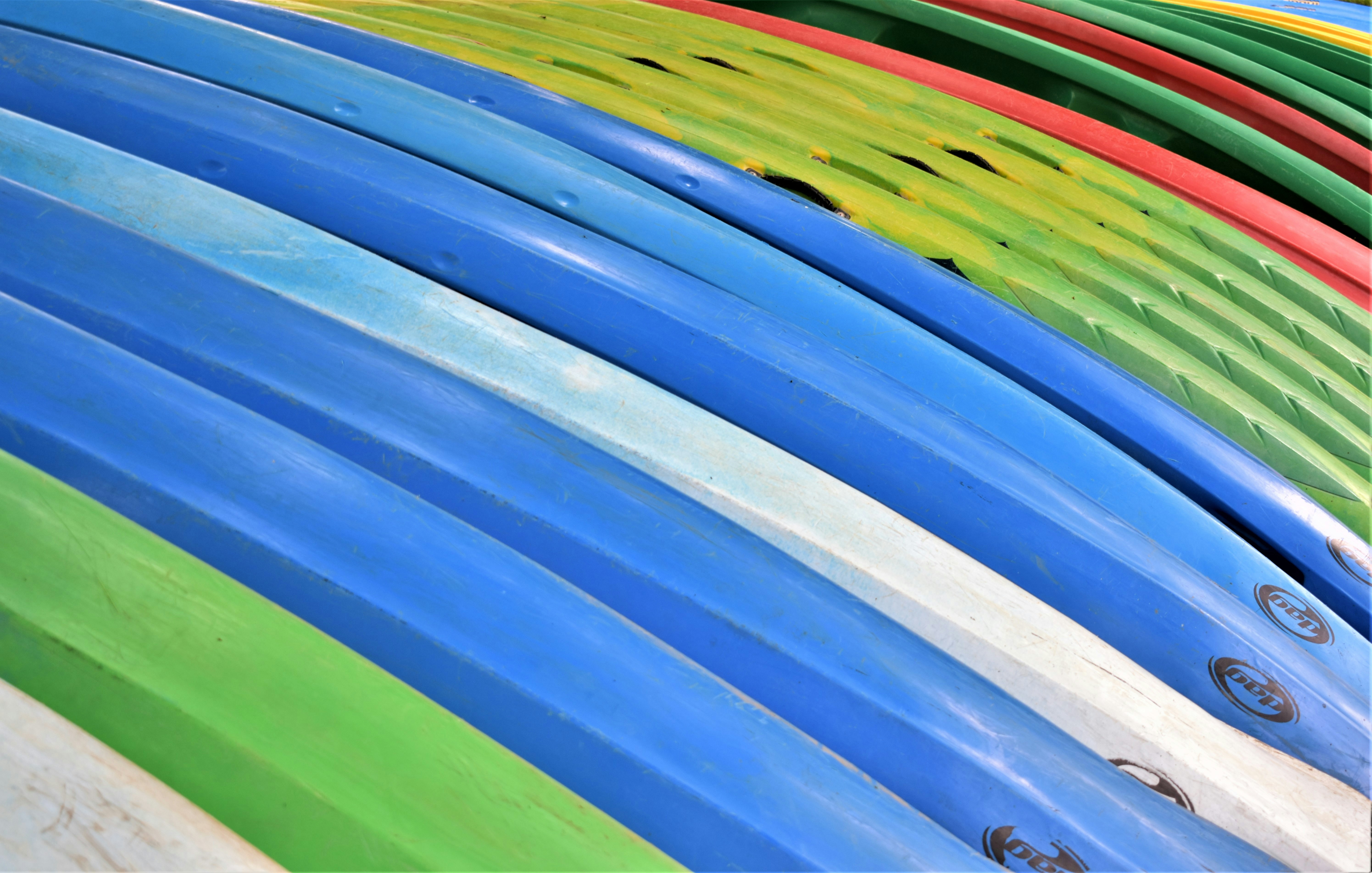 Colorful Kayak Ridges in a Quiet Row