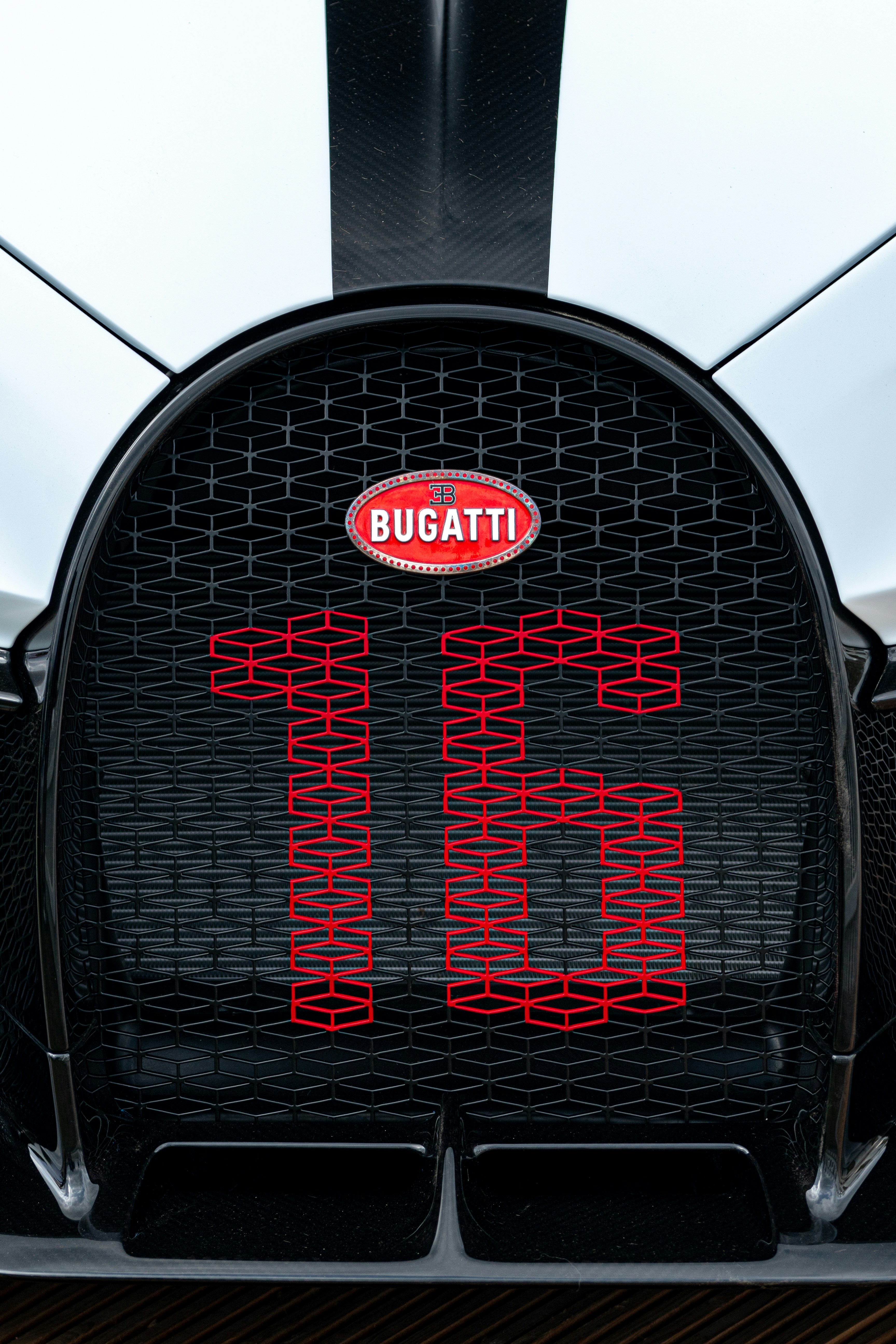 A bugatti logo on the back of a bugatti car photo – Free London Image ...