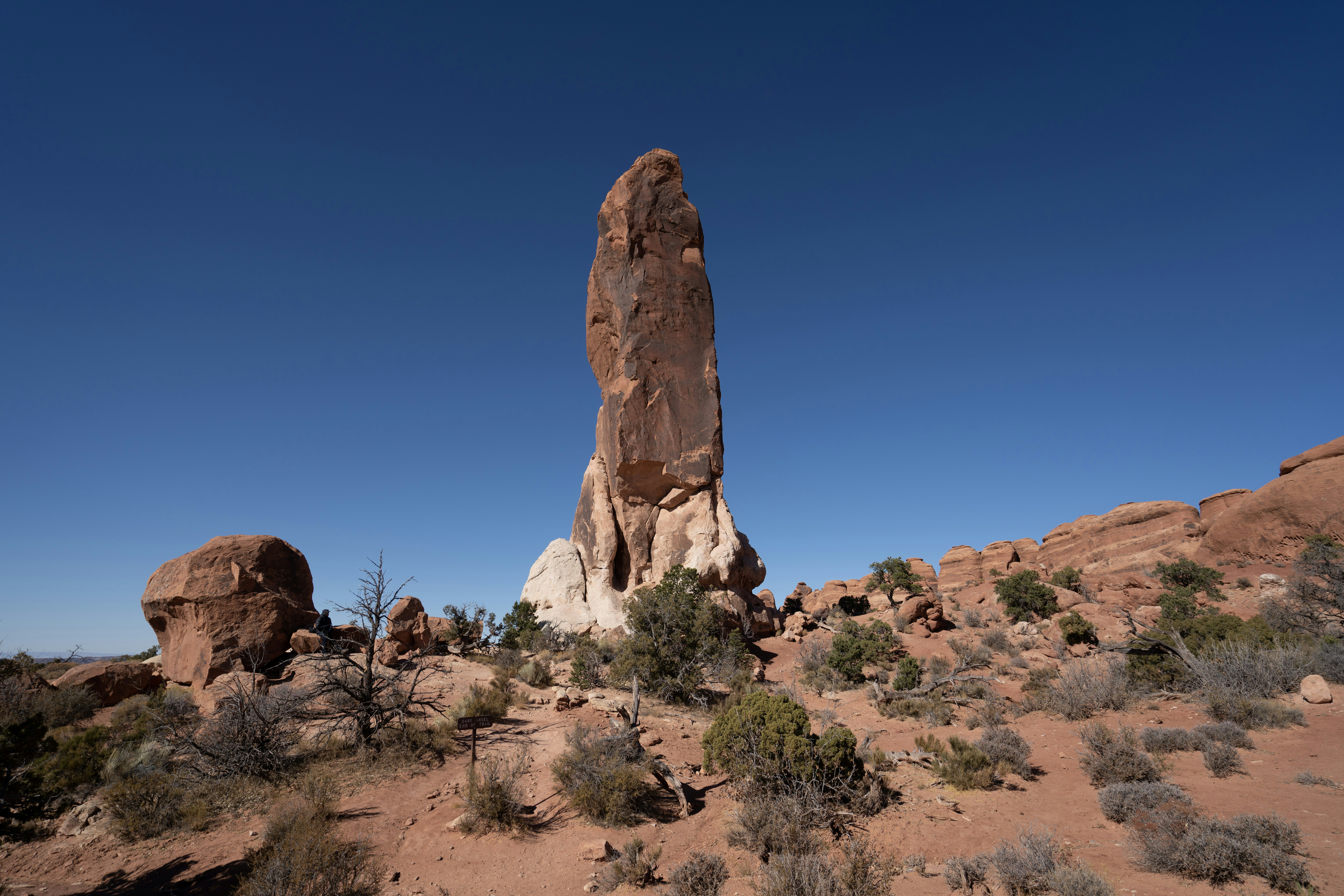 A large rock in the middle of a desert photo – Free Arches national ...