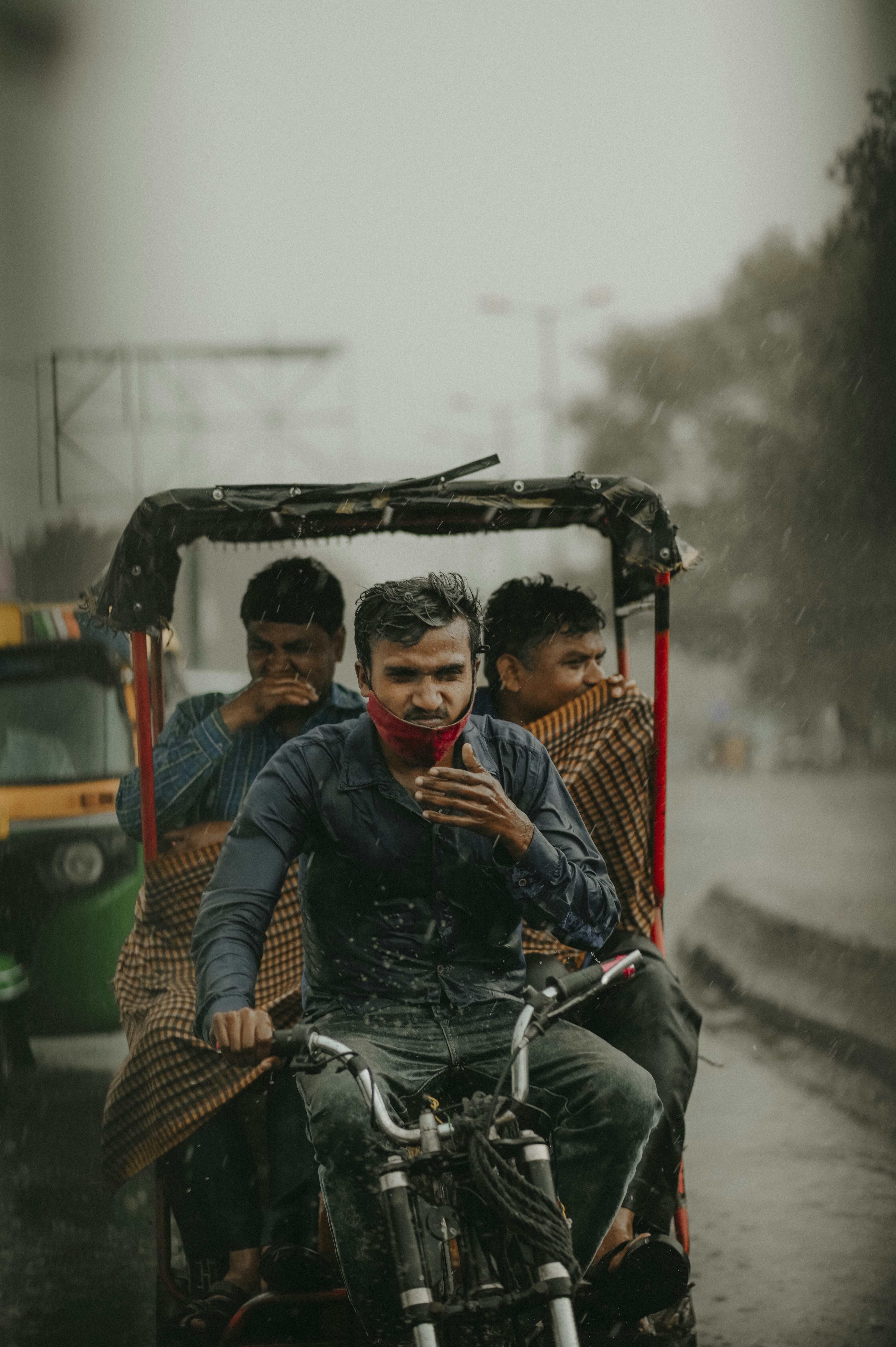 Rainbound Ride: Portrait on a Rain-Slick Rickshaw