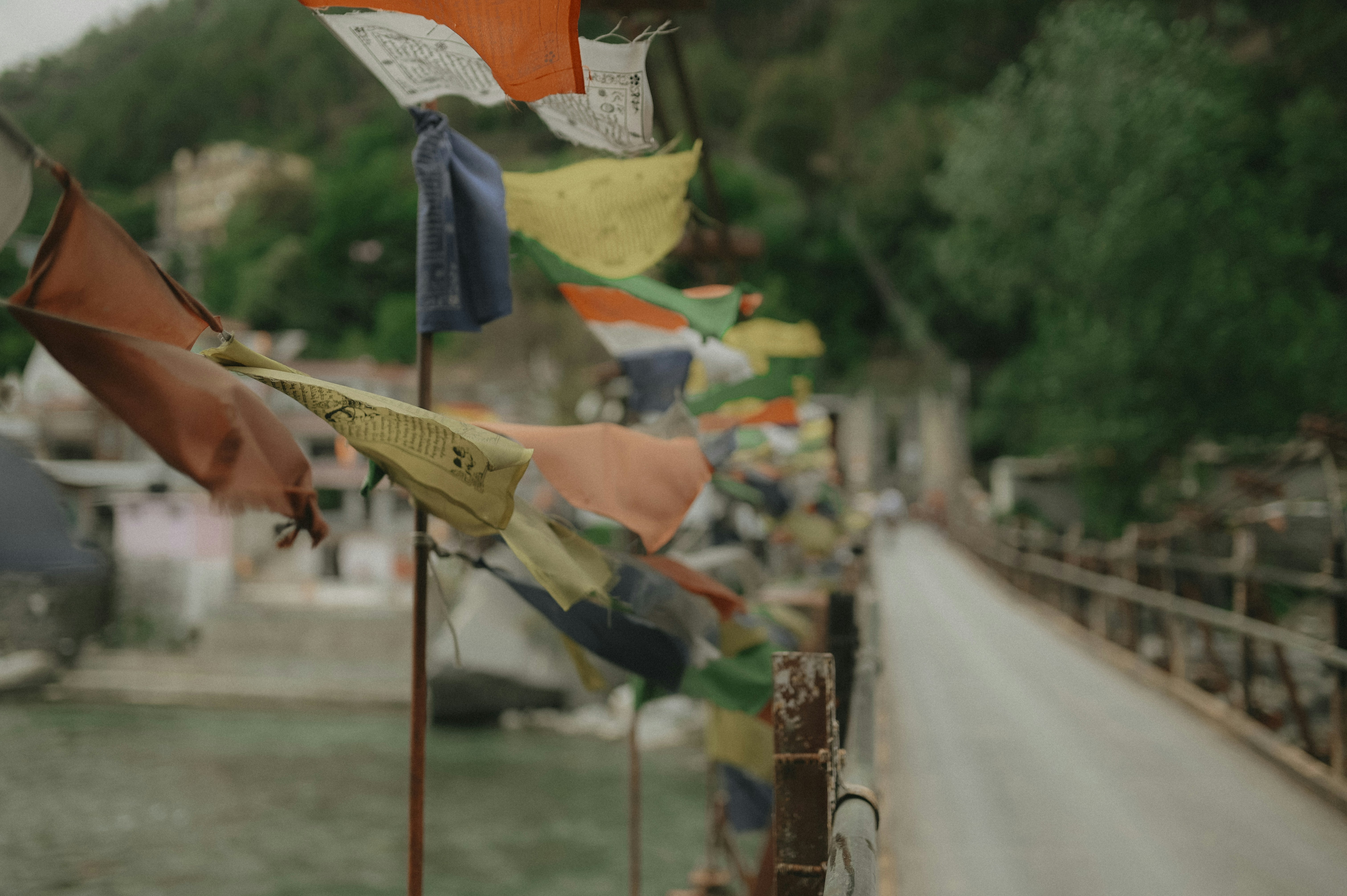 A bunch of flags that are on the side of a road photo – Free Clothing ...