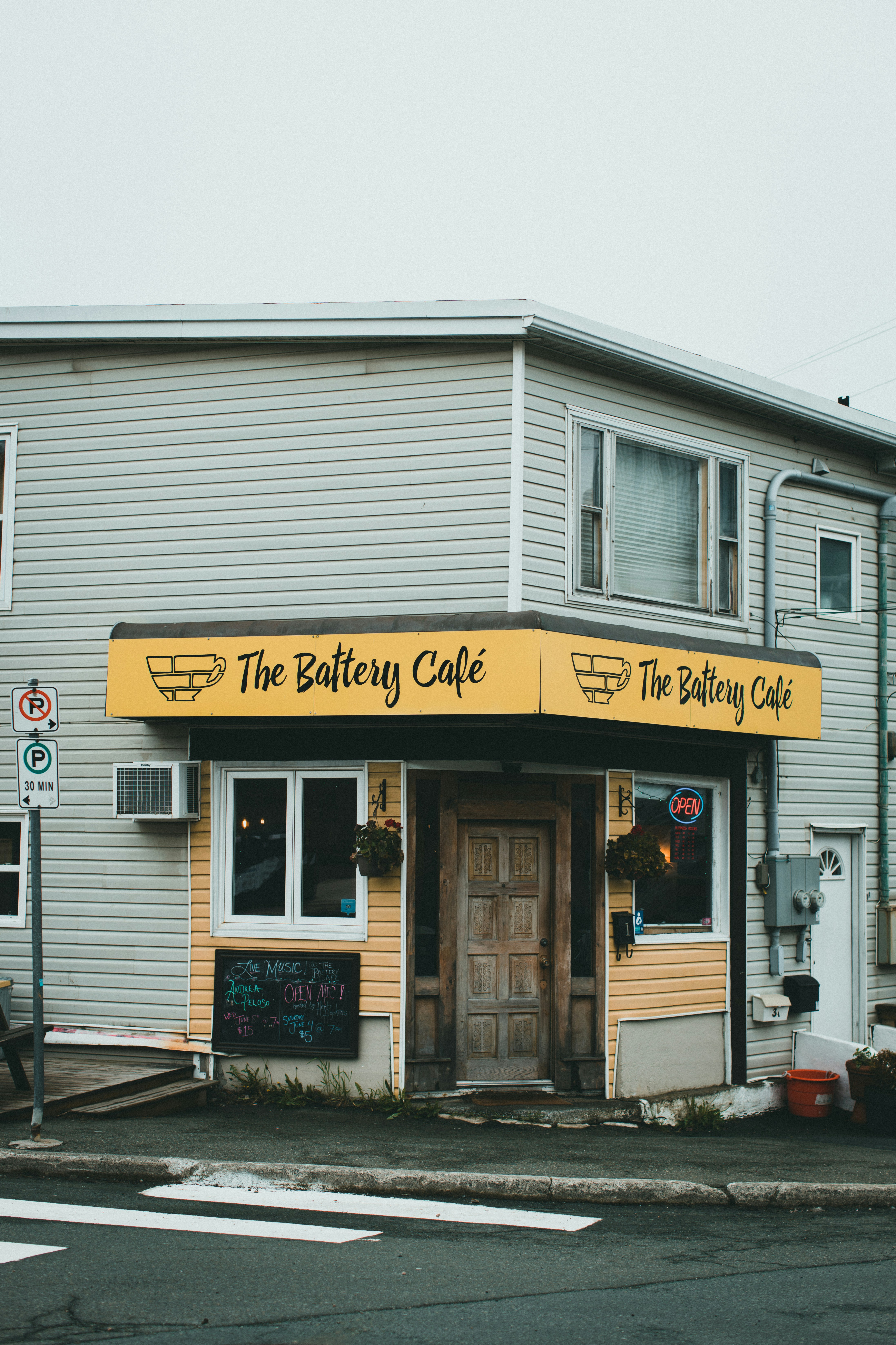 Café Corner: The Battery Café Awning Above a Weathered Door