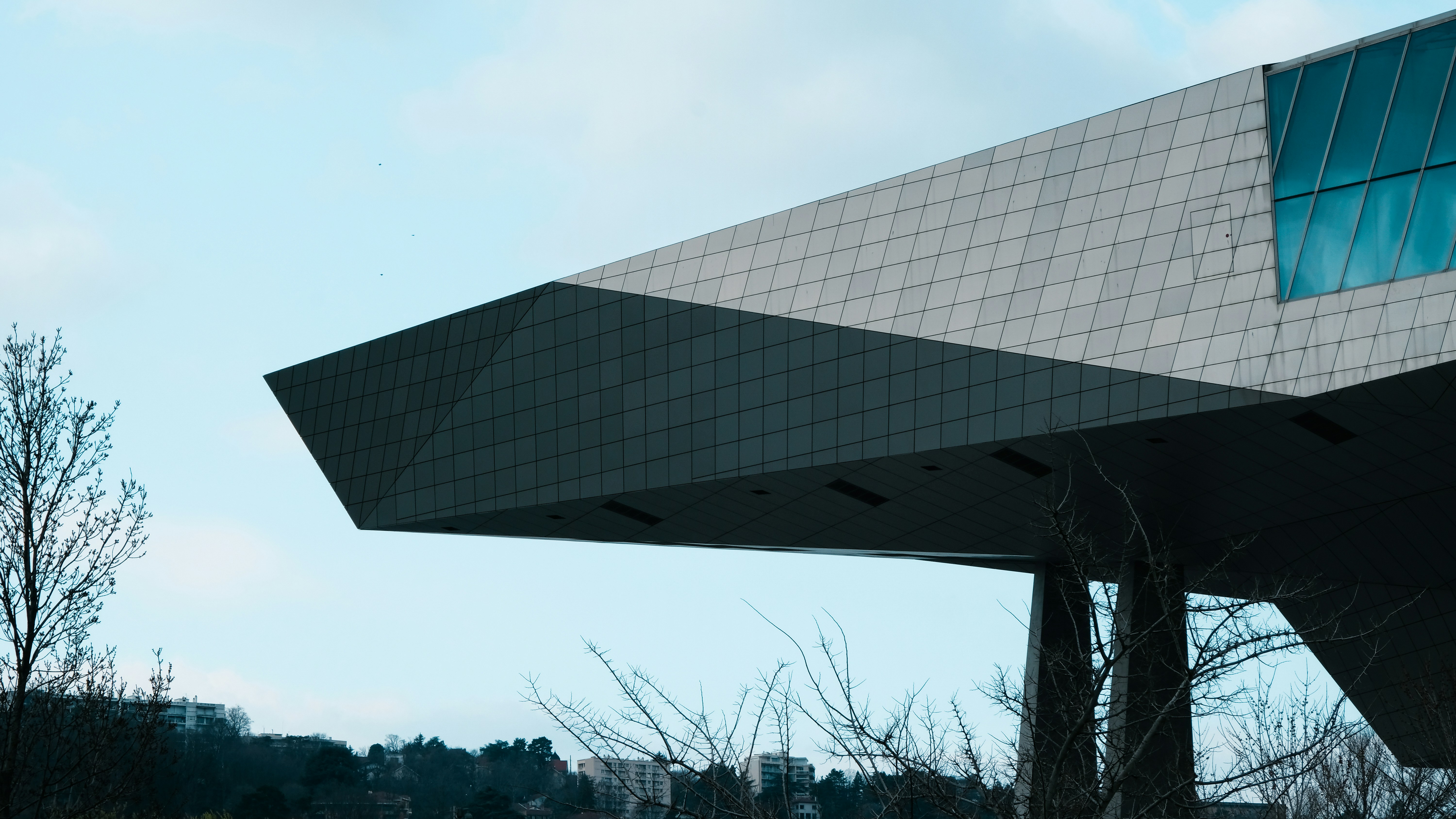 a tall building with a sky background