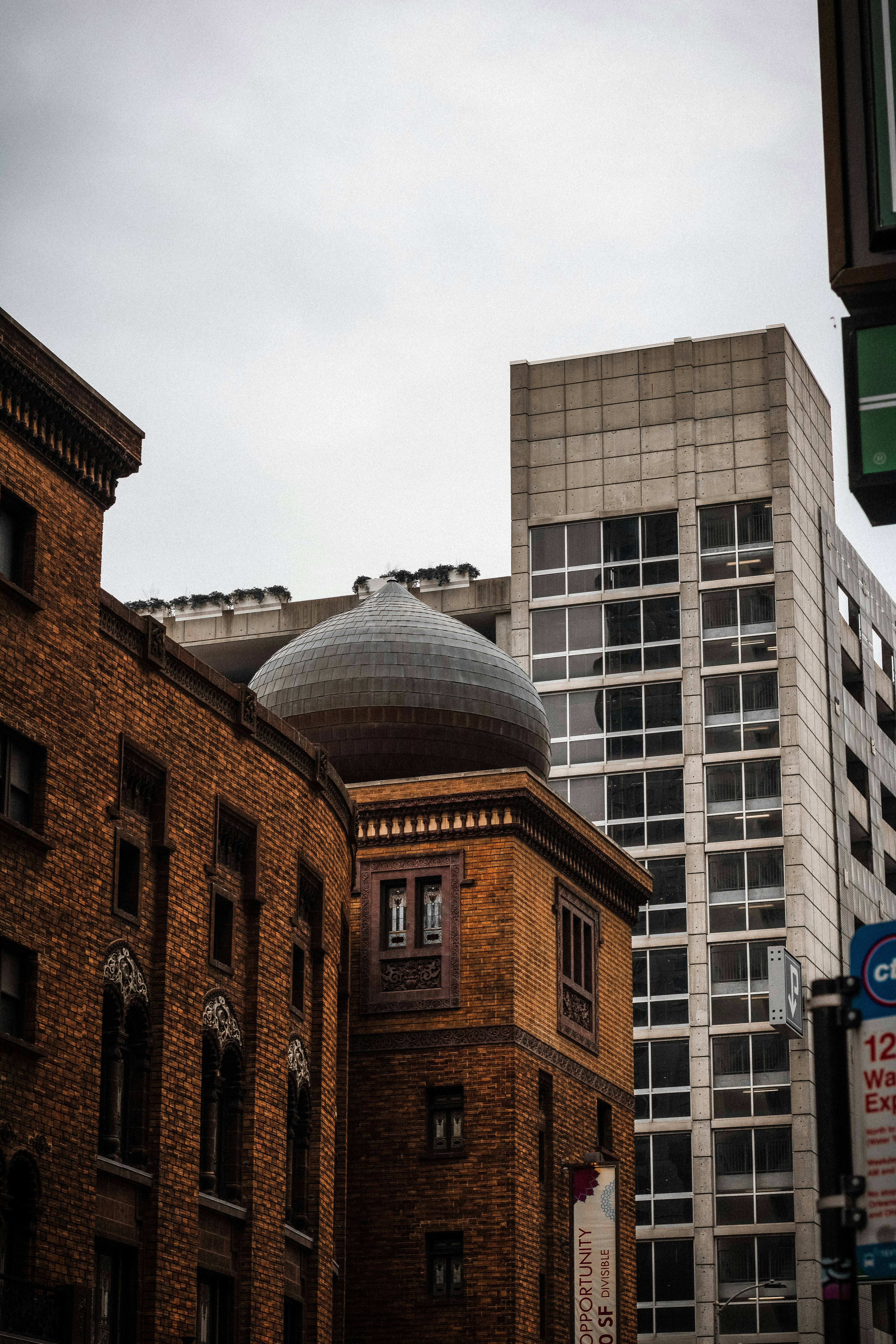 Dome Crowned by Towers: A City Block Between Brick and Glass