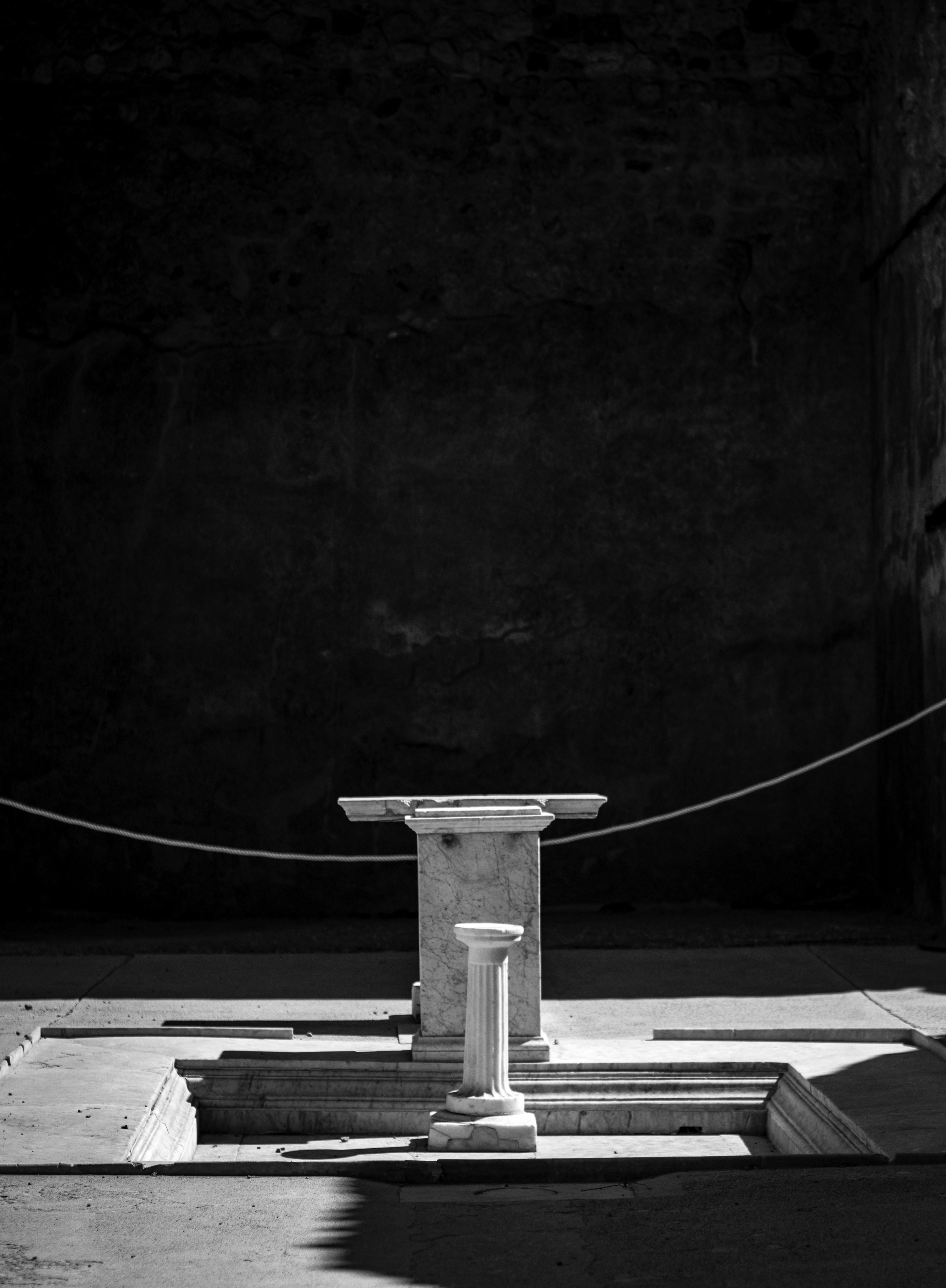 A black and white photo of a pillar and steps photo – Free Grey Image ...
